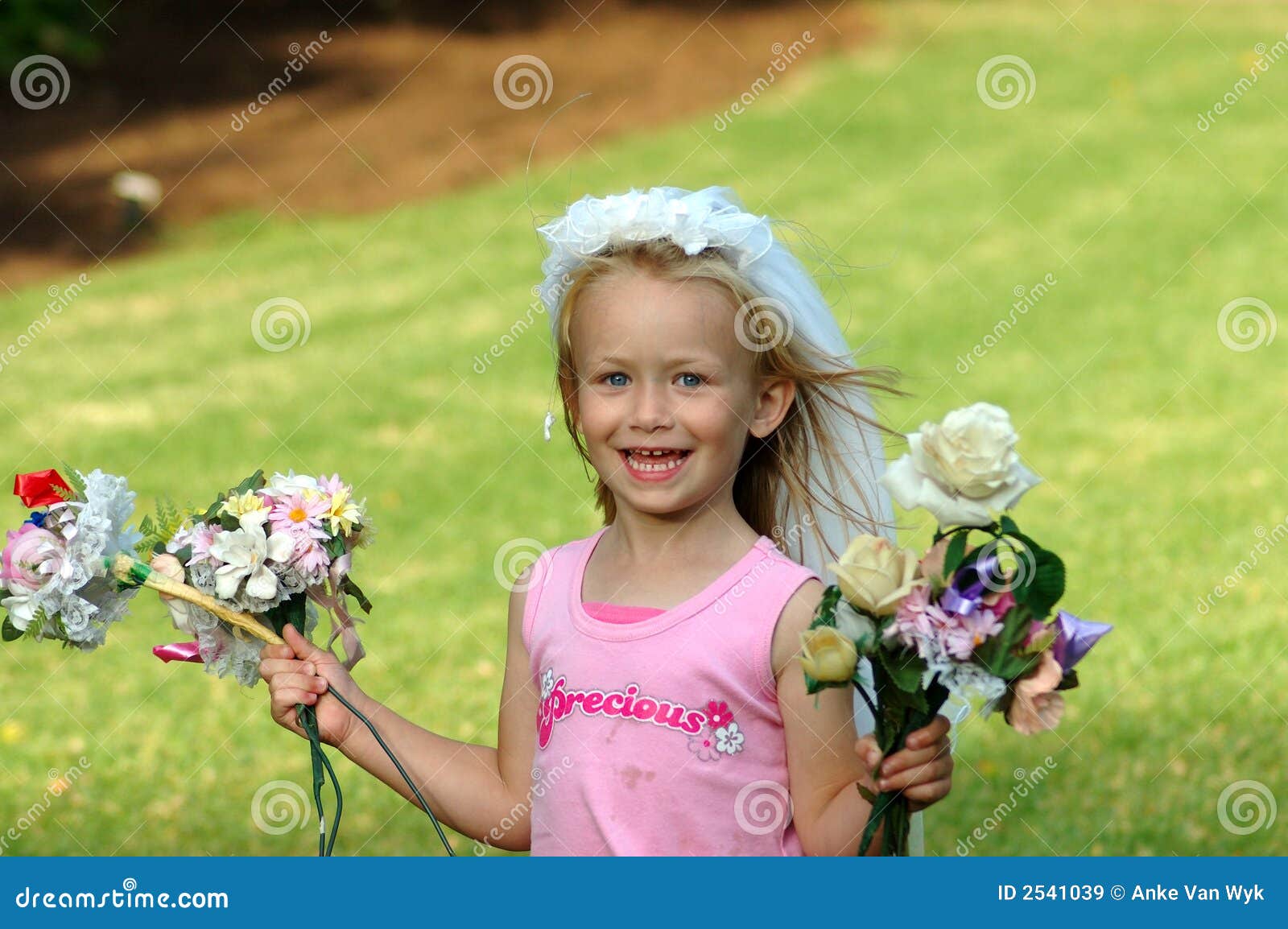 Little girl with roses stock image. Image of child, expression - 2541039