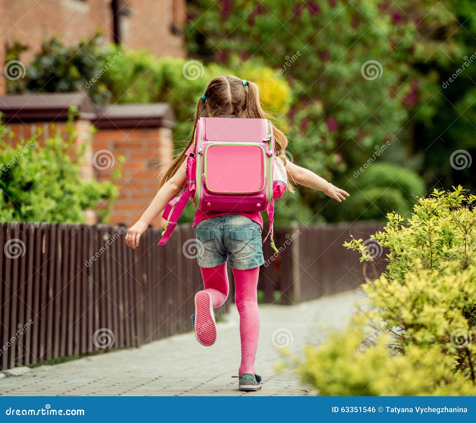 Little girl run to school stock photo. Image of hair - 63351546