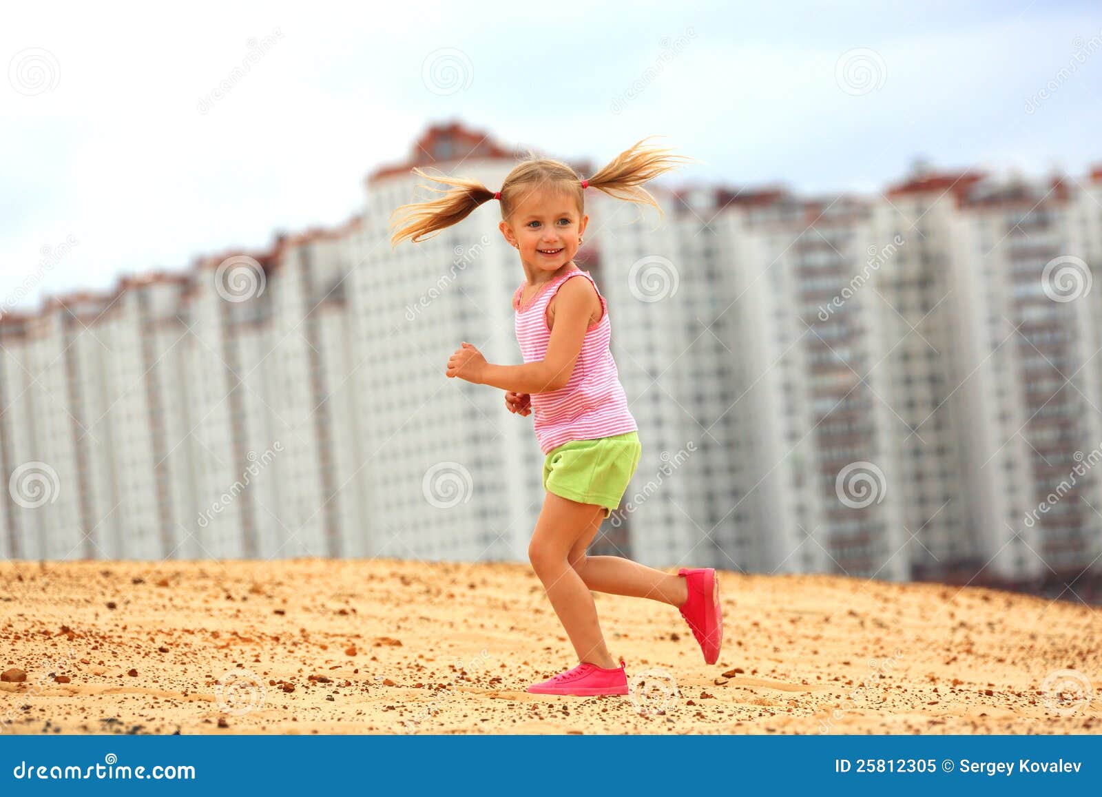 Little Girl Running in Sand Stock Image - Image of female, cute: 25812305