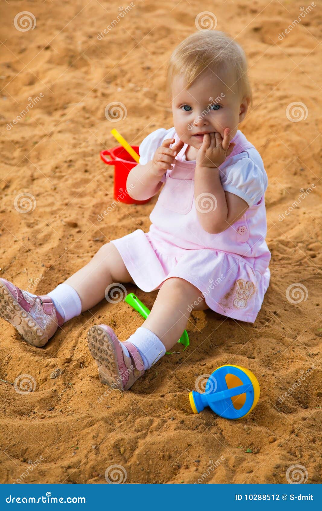 Little girl in sandbox stock photo. Image of playground - 10288512