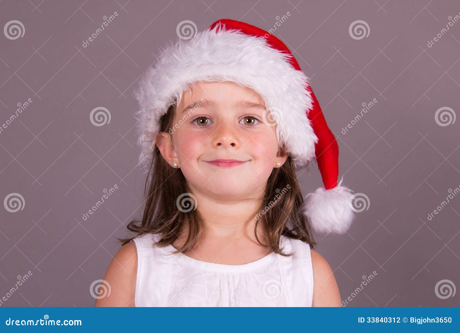 Little girl with Santa hat stock photo. Image of childhood - 33840312