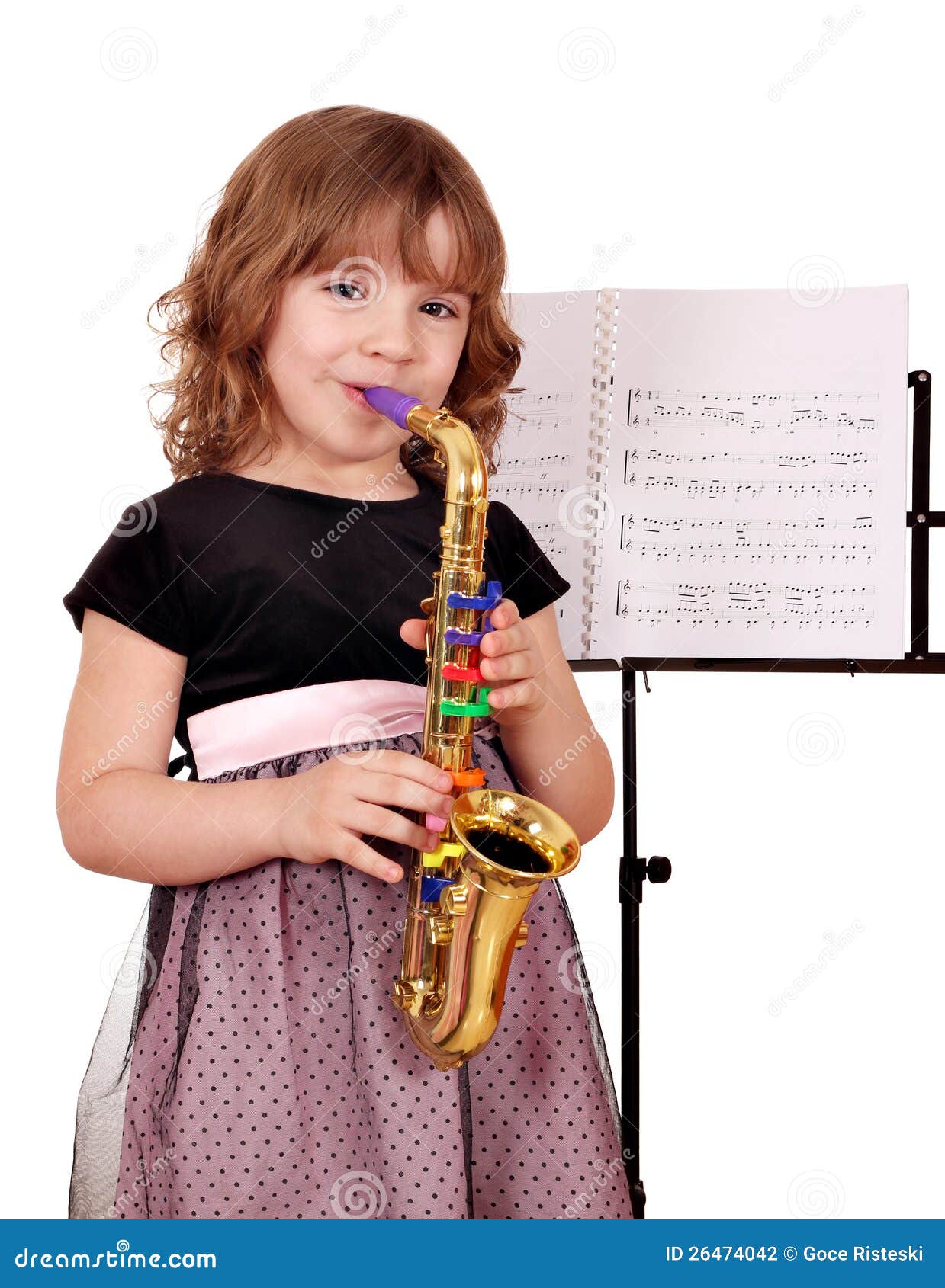 Little girl with saxophone stock photo. Image of people - 26474042