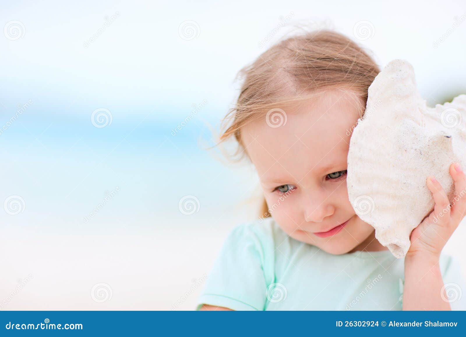 Little girl with seashell stock photo. Image of cute - 26302924
