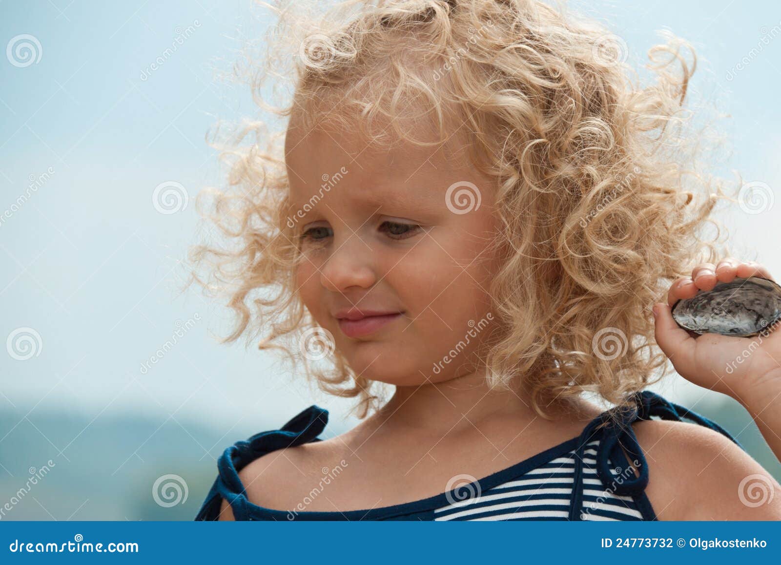 Little girl with shell stock photo. Image of tropical - 24773732