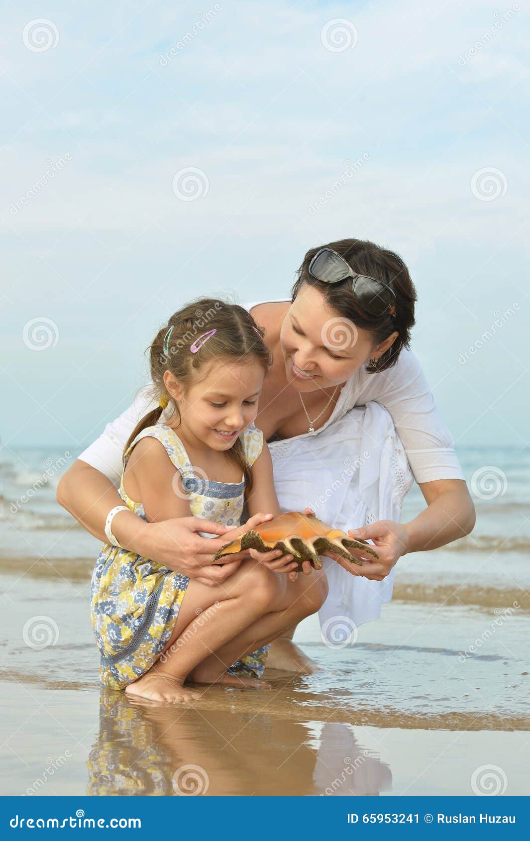 Little girl with shell stock image. Image of pretty, adorable - 65953241