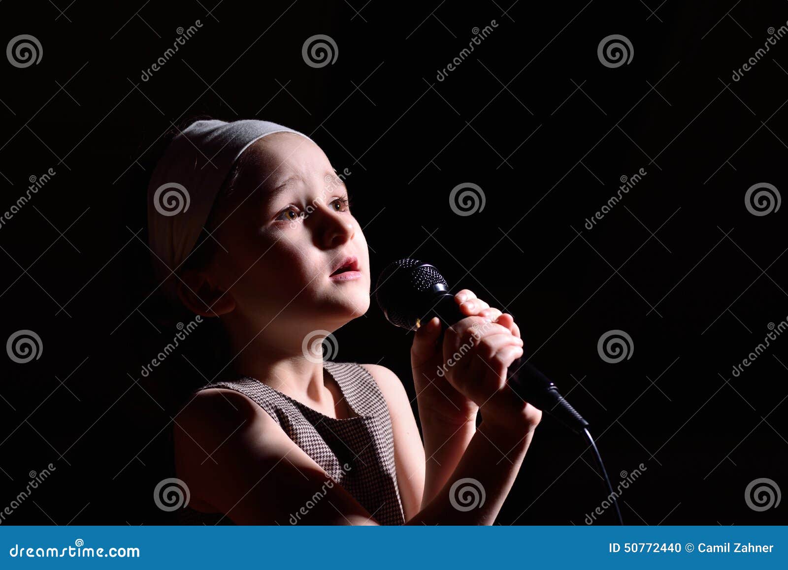 Little girl singing stock photo. Image of performance - 50772440