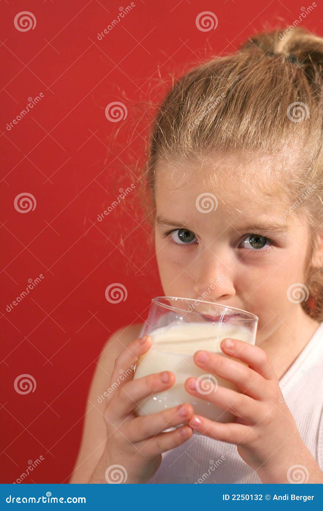 Little girl sipping milk stock photo. Image of hungry - 2250132