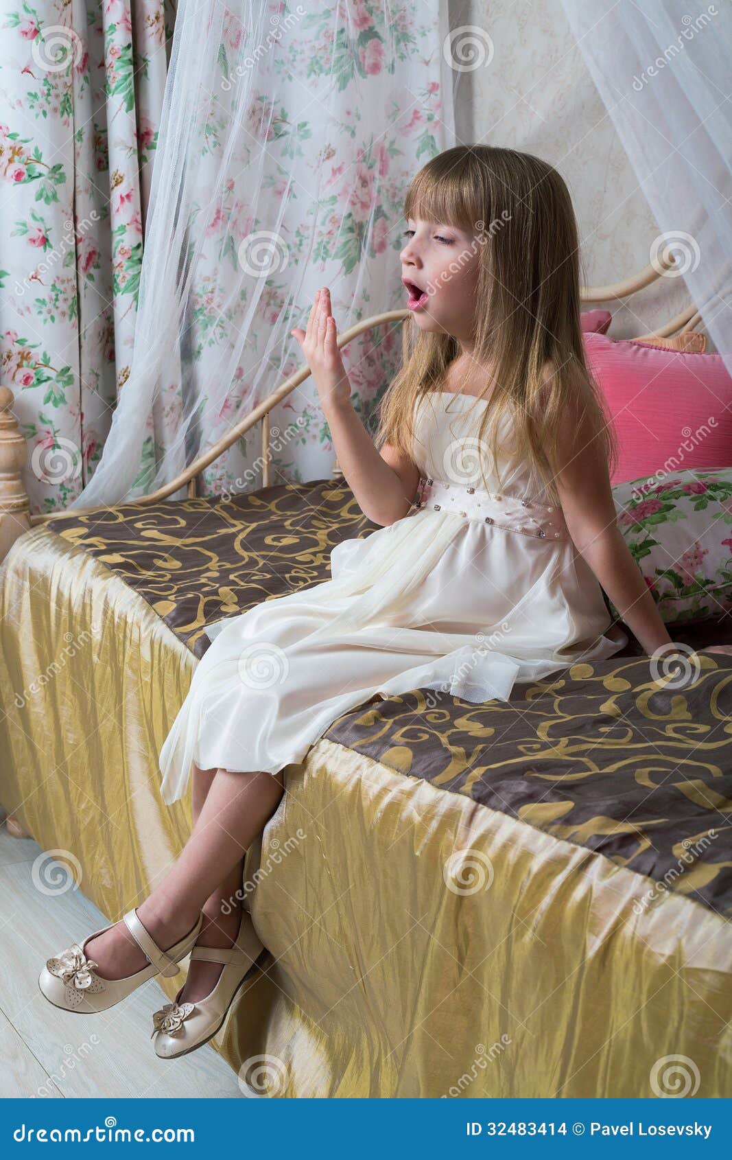 A Little Girl Sits on a Large Bed Stock Photo - Image of cushion, child ... A Little Girl Sits on a Large Bed Stock Photo - Image of cushion, child ...
