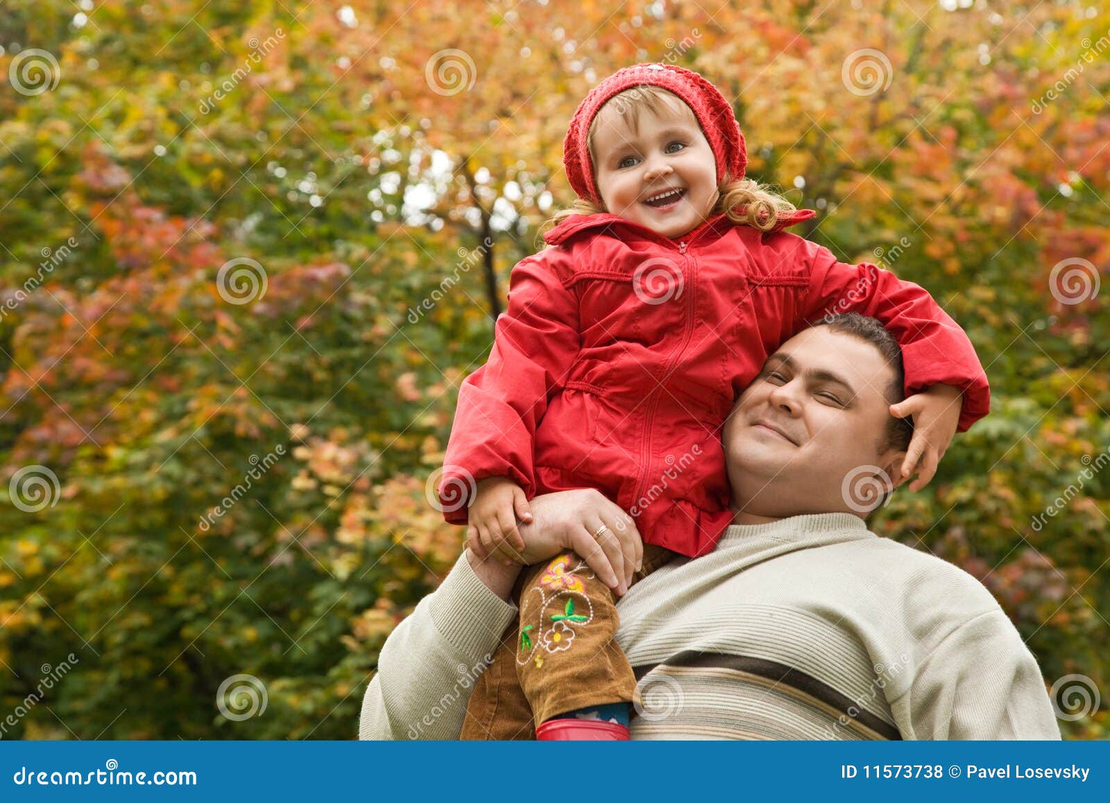Little Girl Sits on Shoulder at Man in Park Stock Photo - Image of ...