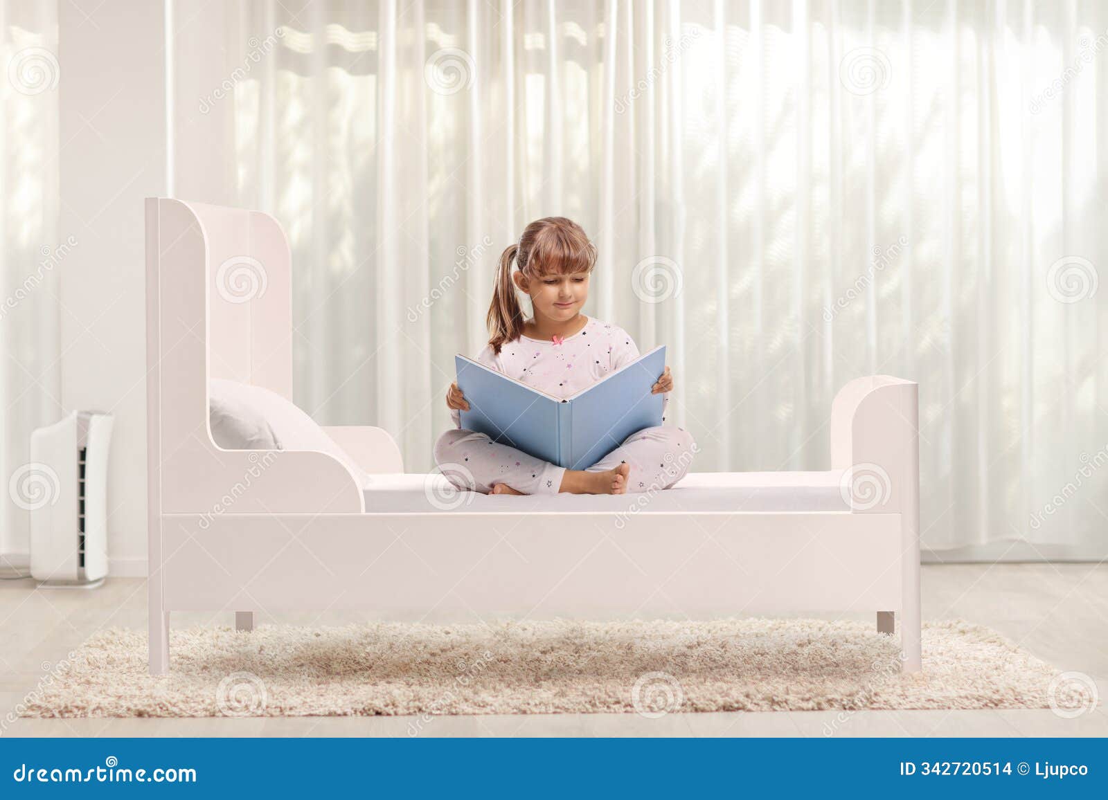 Girl Sitting in Bed and Reading a Book Stock Photo - Image of child ...