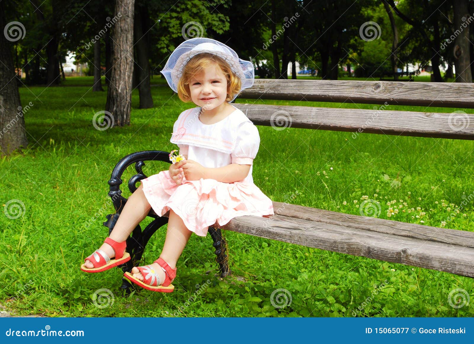 Little Girl Sitting on the Bench Stock Image - Image of sweet, green ...