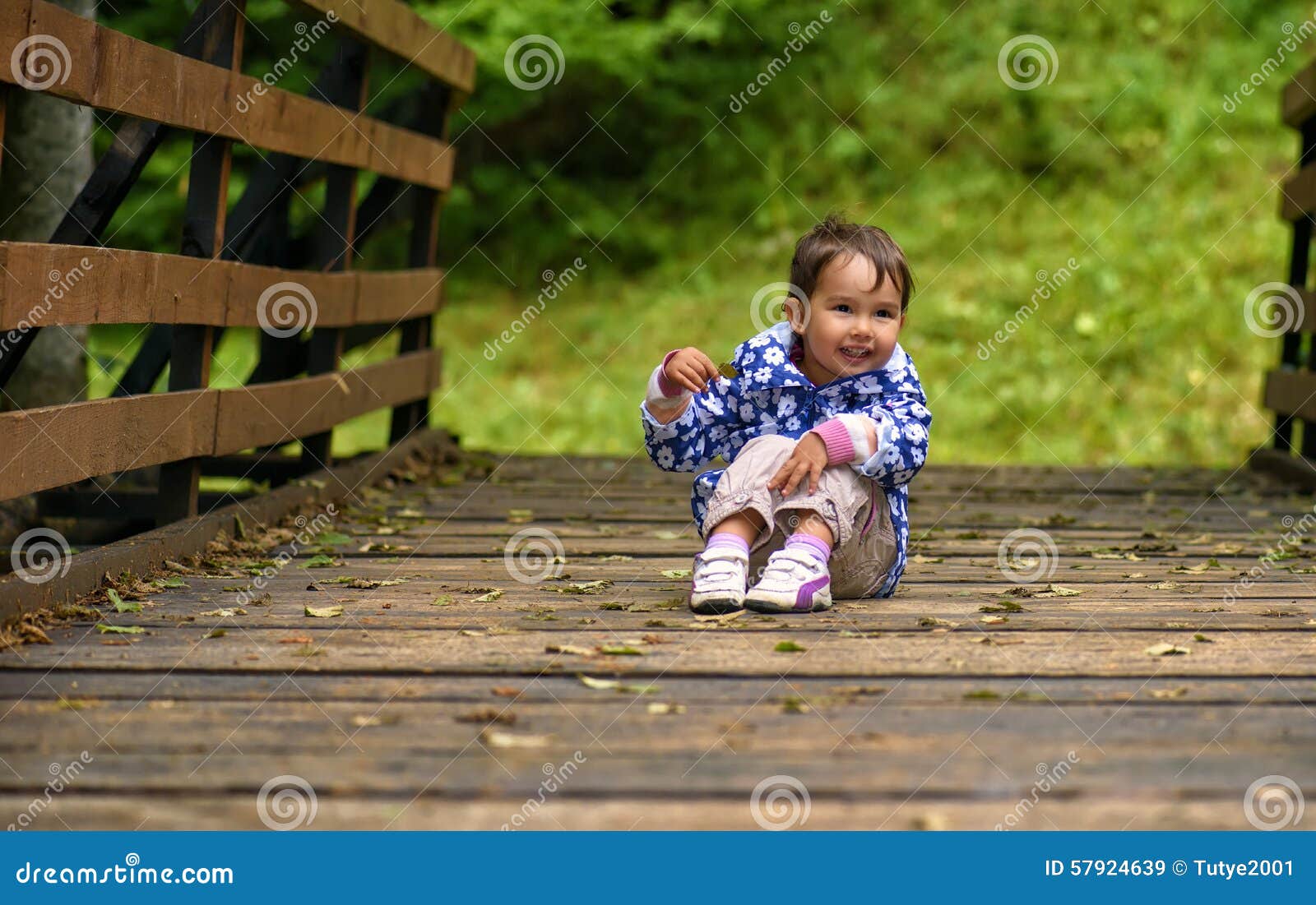 Little Girl Sitting on the Bridge Stock Image - Image of cheerful ...