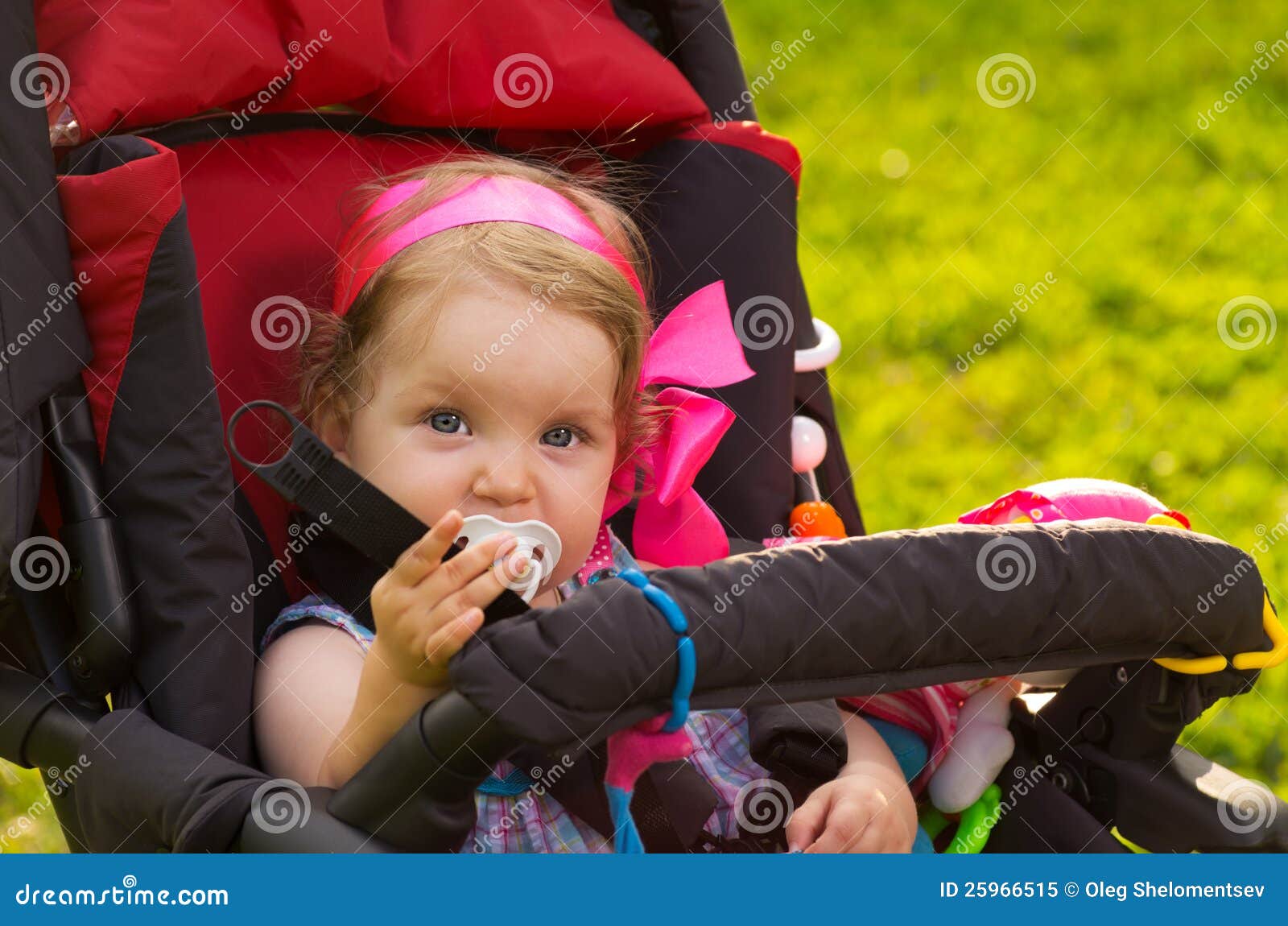 Little Girl Sitting in the Stroller Stock Image - Image of kids ...