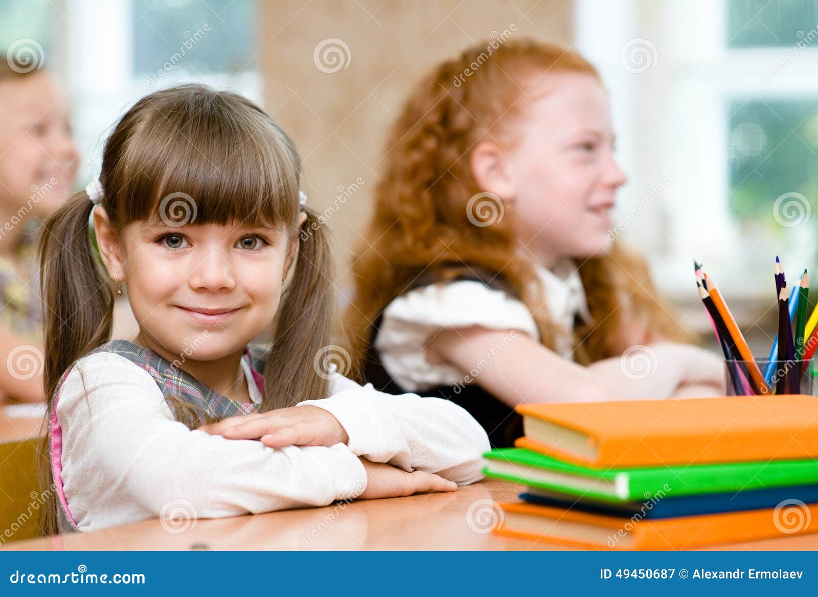 Little Girl Sitting and Studying at School Class Stock Image - Image of ...