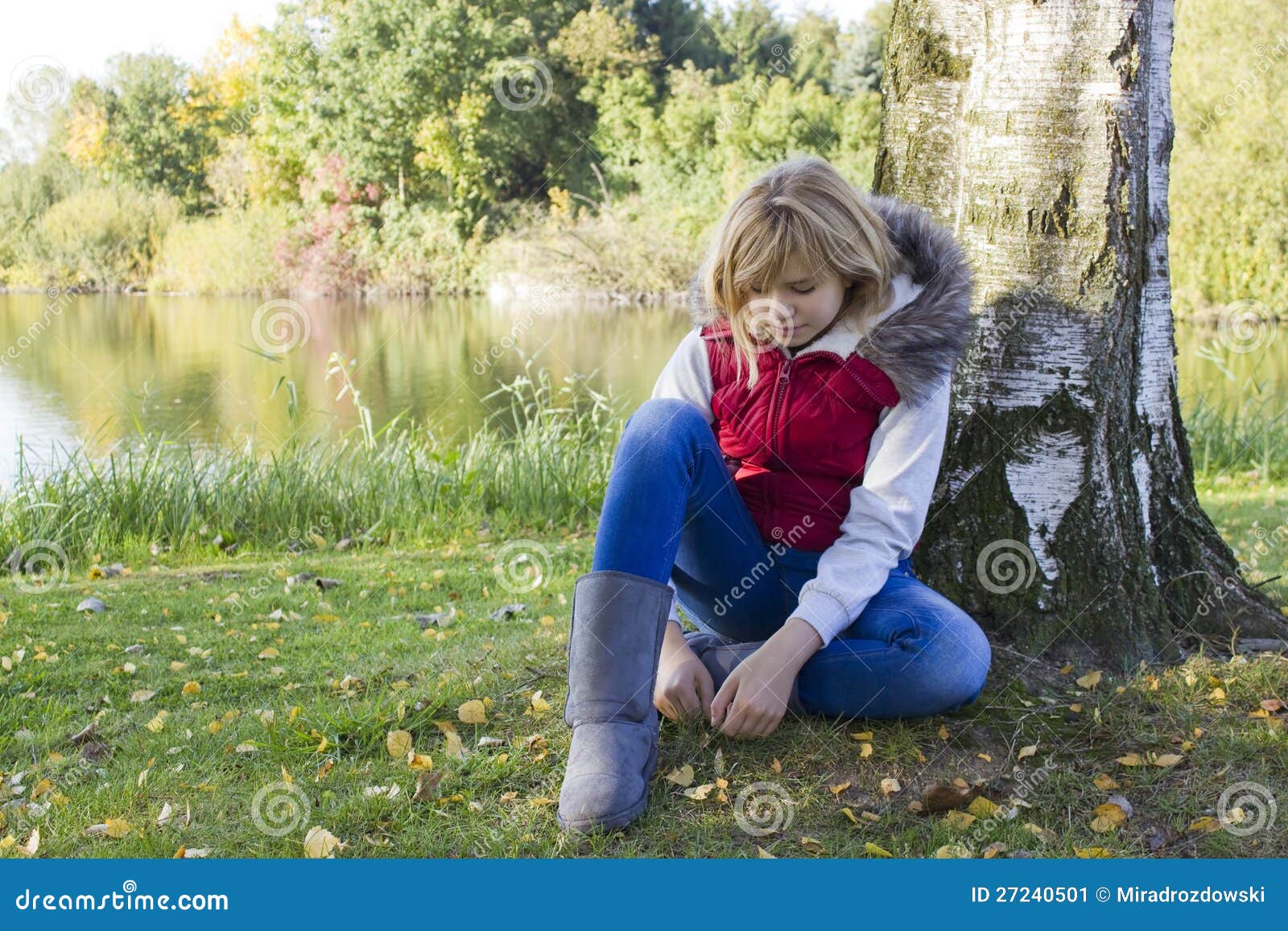 A Little Girl Sitting Under Tree Stock Image - Image of face, october ...