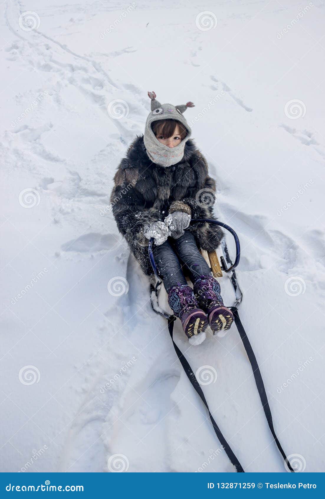 Little girl on sledge stock image. Image of girl, happiness - 132871259