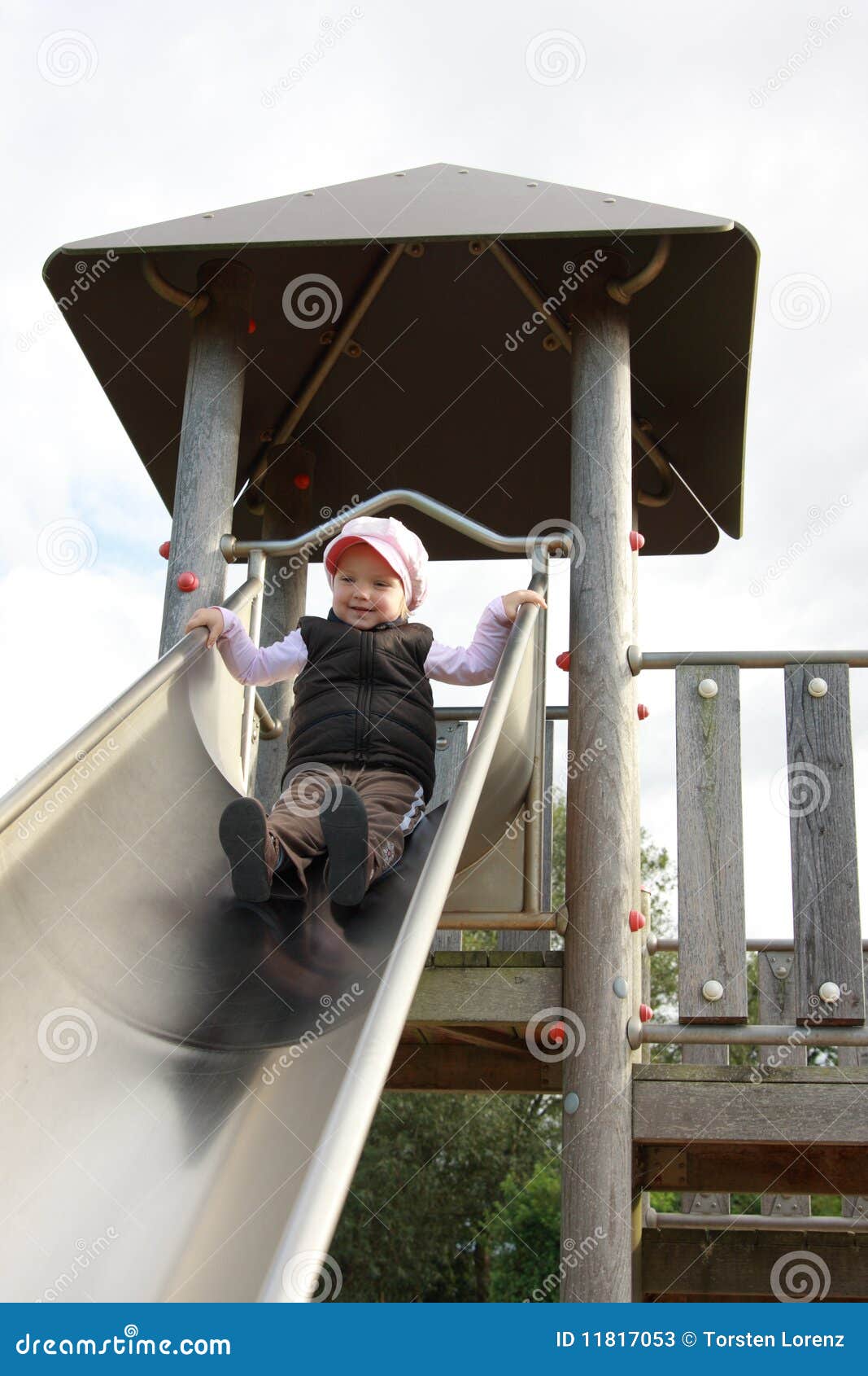 Little girl on a slide stock image. Image of adoreable - 11817053