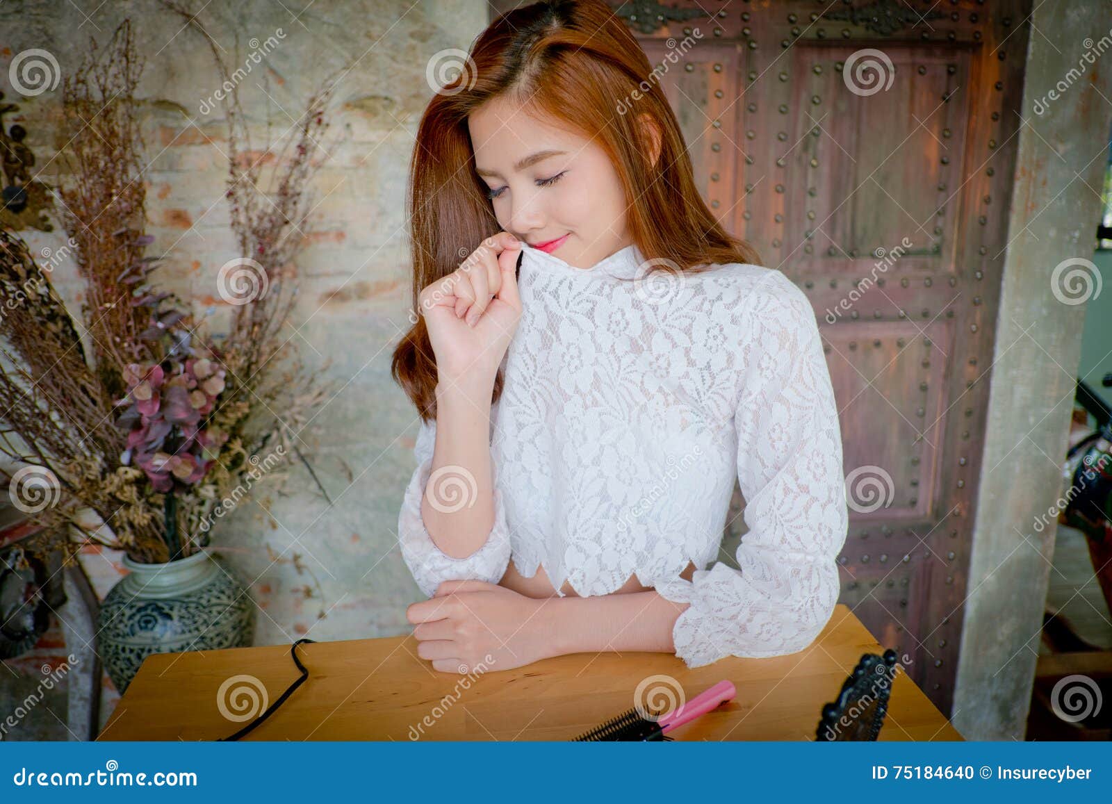 Little Girl is Smelling the Perfume on the Neck . Stock Photo - Image ...