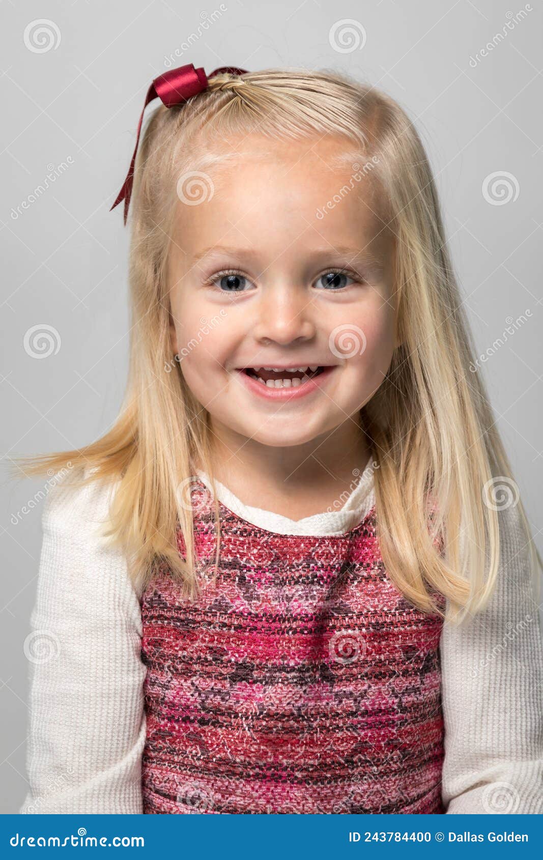 Little Girl Smiling at Camera on a White Background Stock Photo - Image ...