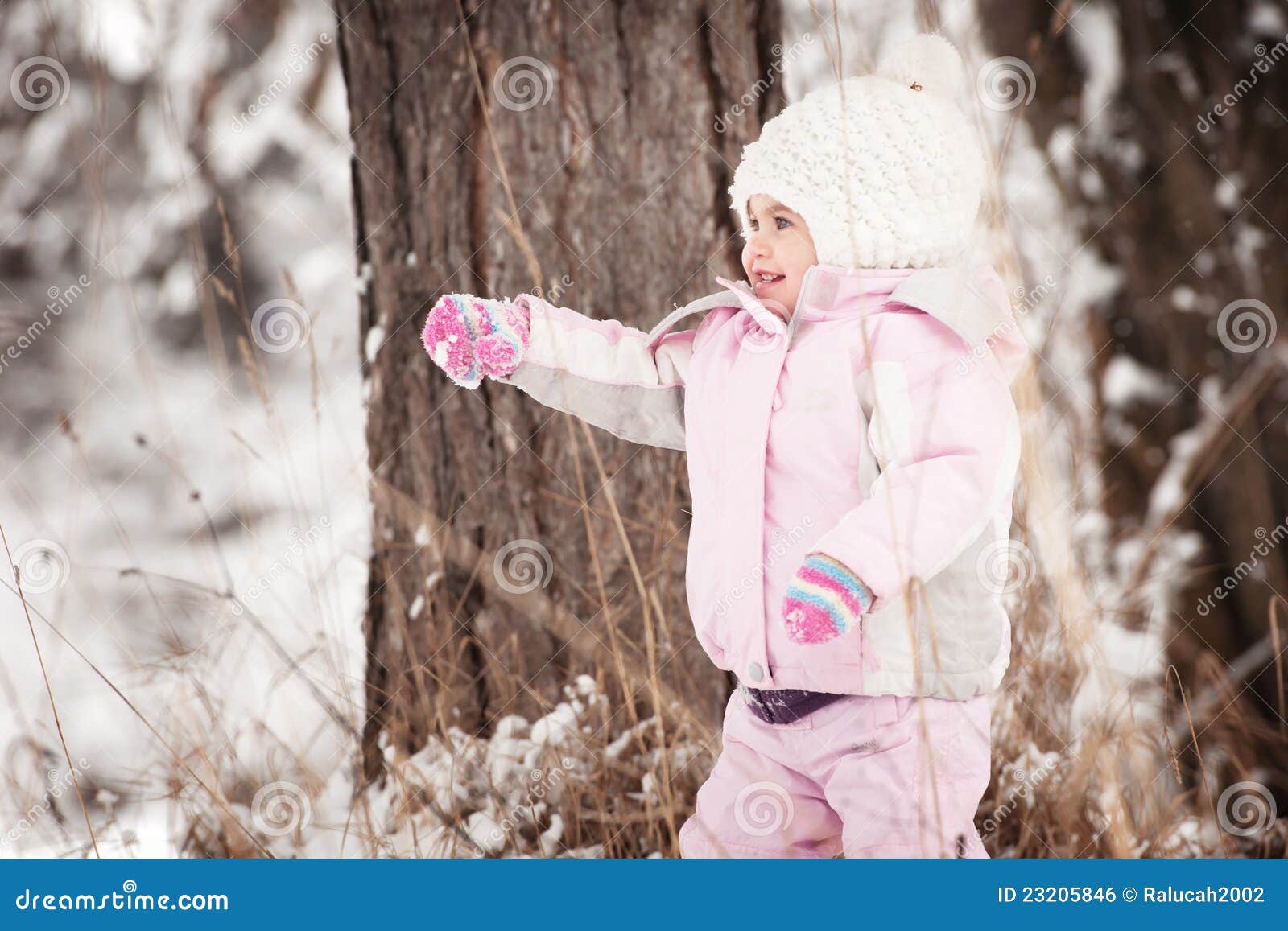 Little girl and snow stock photo. Image of female, december - 23205846