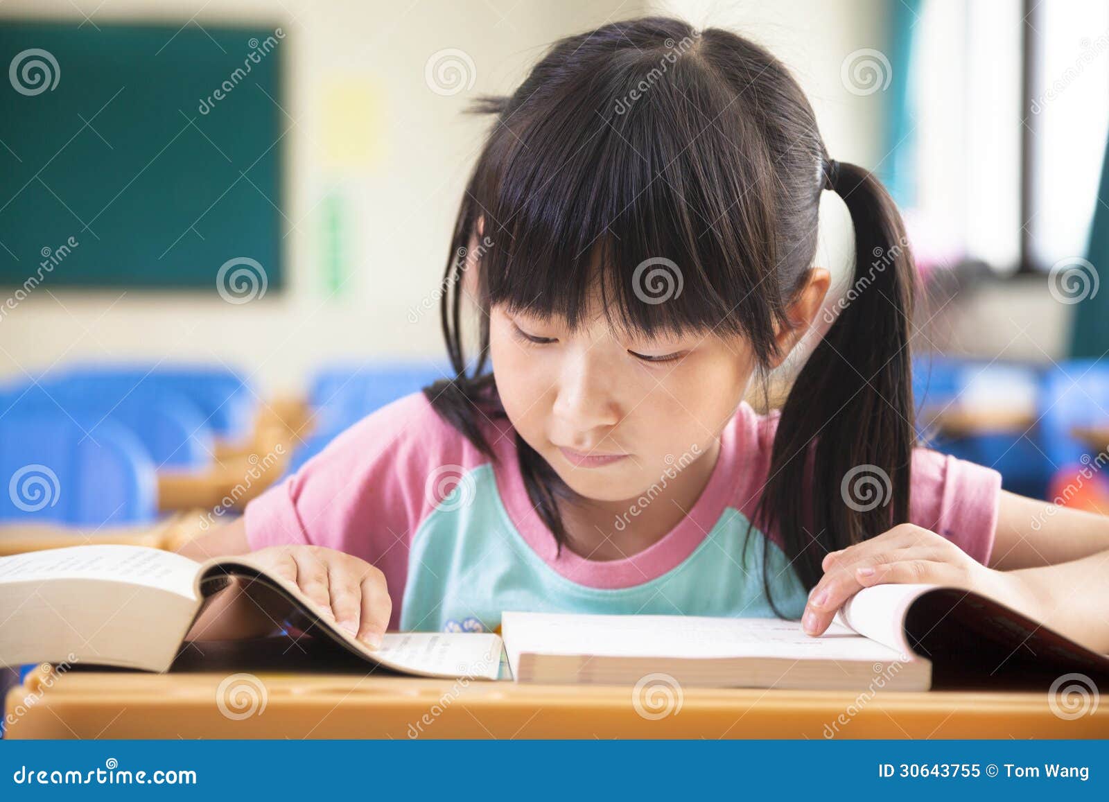 Little Girl Study Alone in the Classroom Stock Image - Image of ...