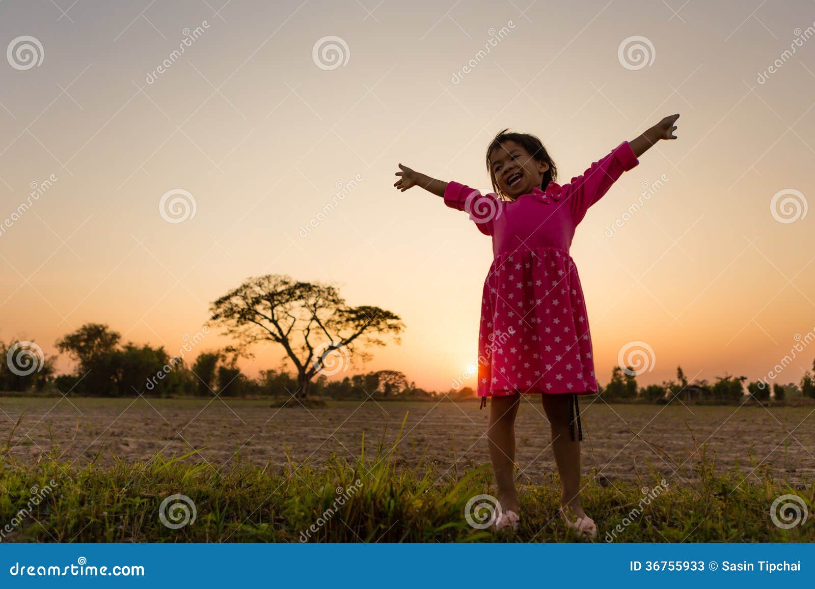 Little girl with sunset stock image. Image of grass, play - 36755933