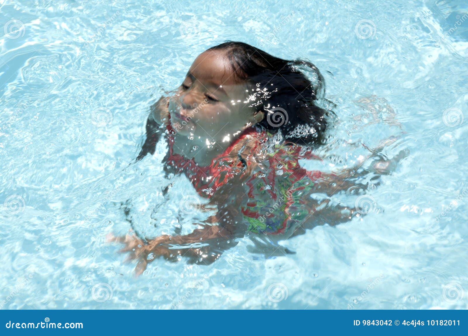 Little girl swimming stock photo. Image of childhood, people - 9843042