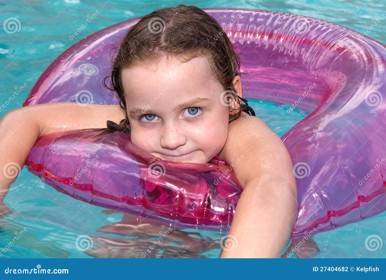Little Girl Swimming in Pool with Float Stock Photo - Image of safety ...