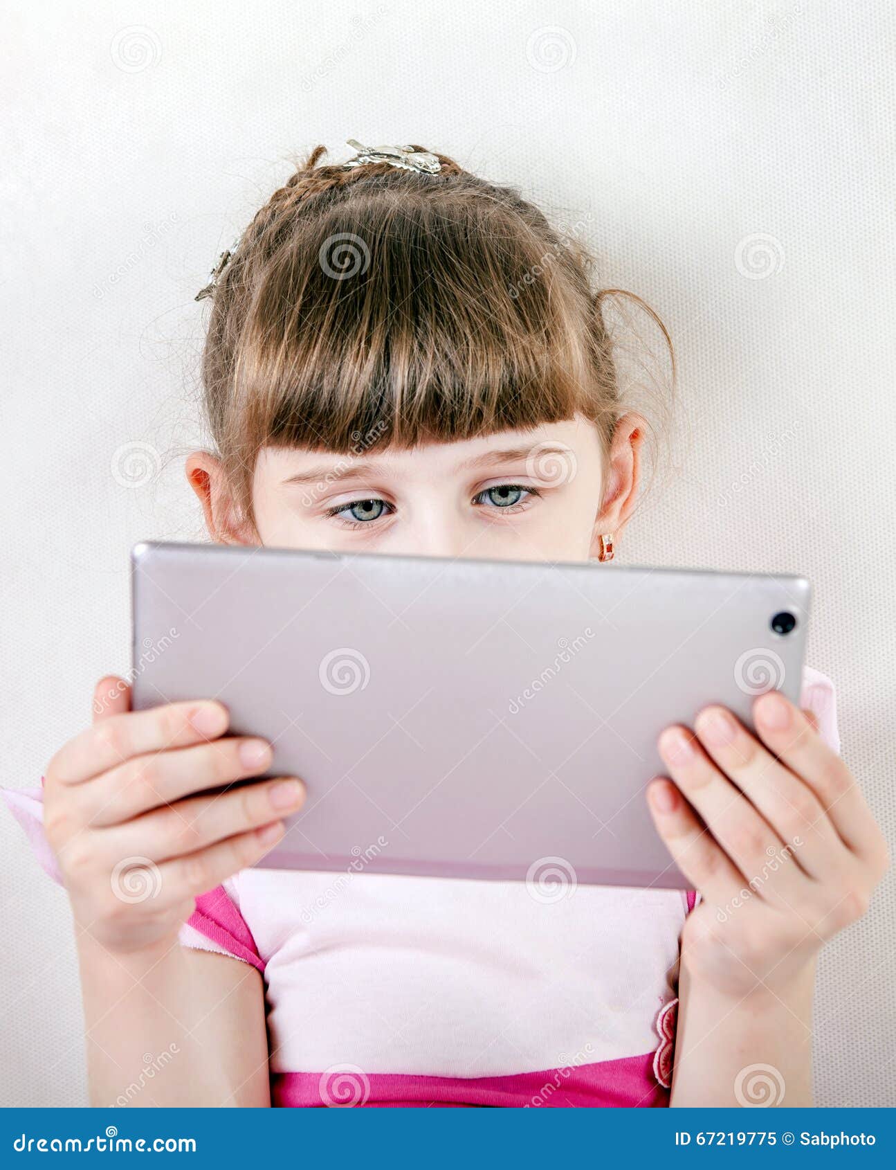 Little Girl with Tablet stock image. Image of palmtop - 67219775