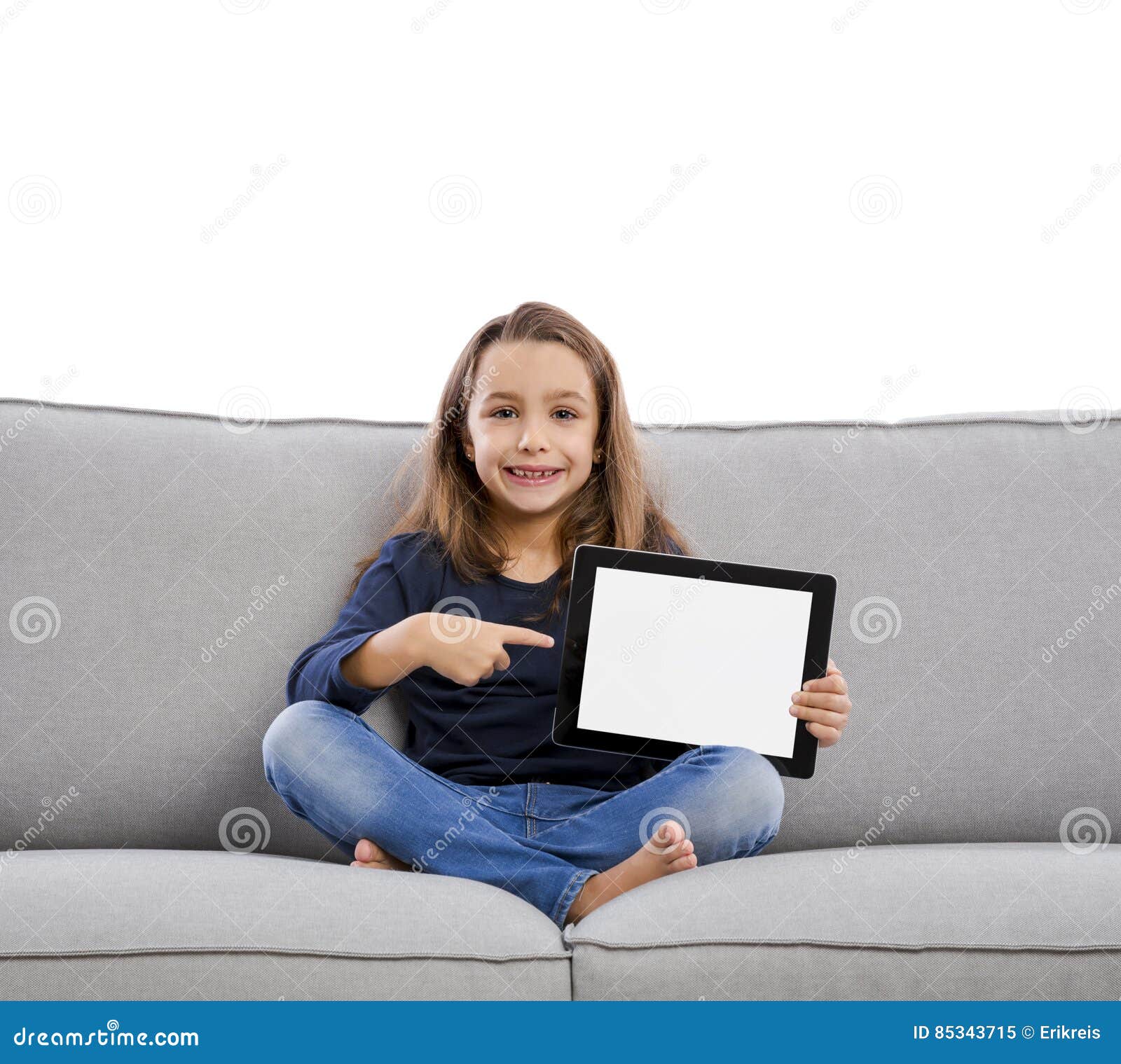 Little girl with a tablet stock image. Image of show - 85343715