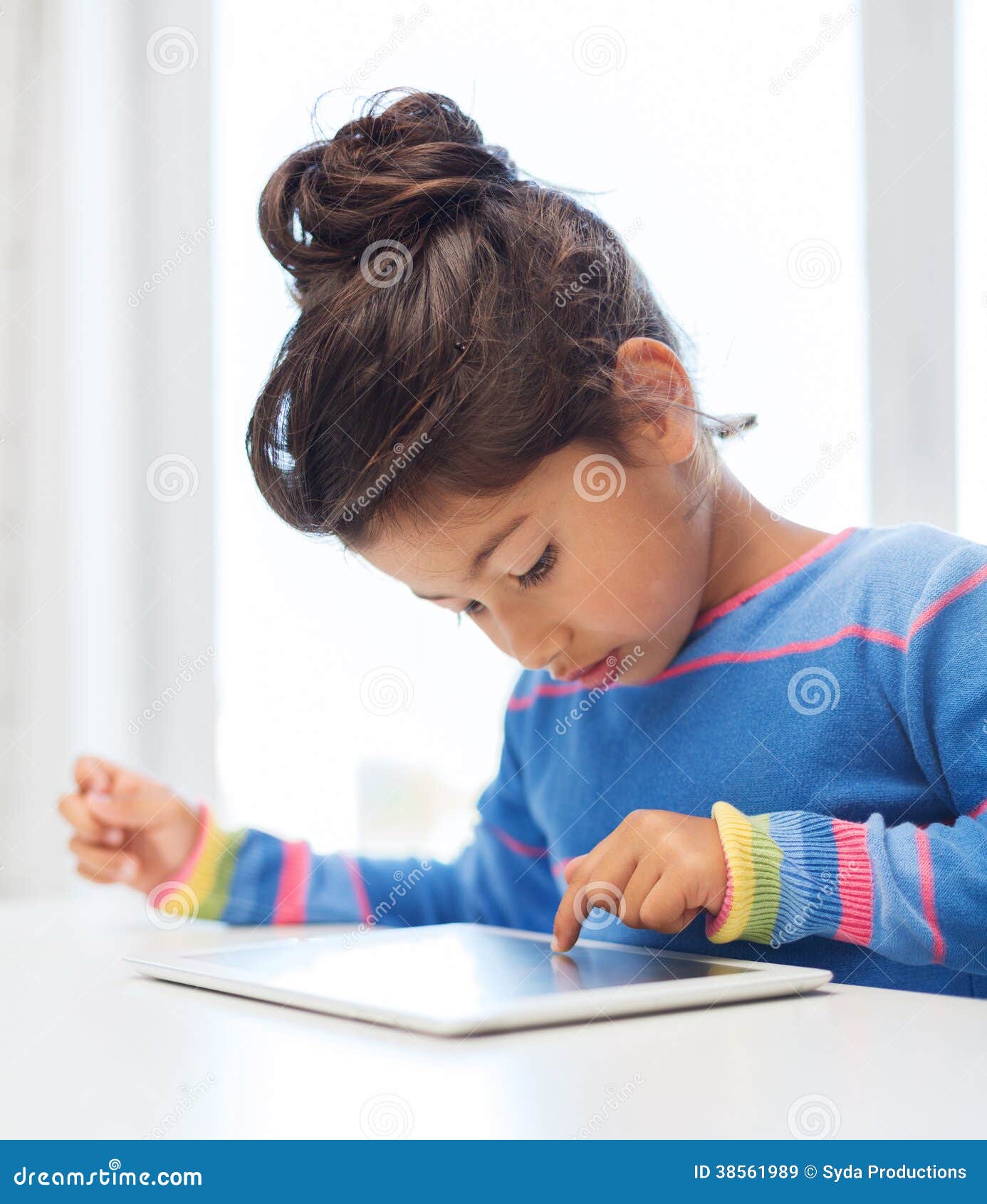Little girl with tablet pc stock image. Image of childhood - 38561989