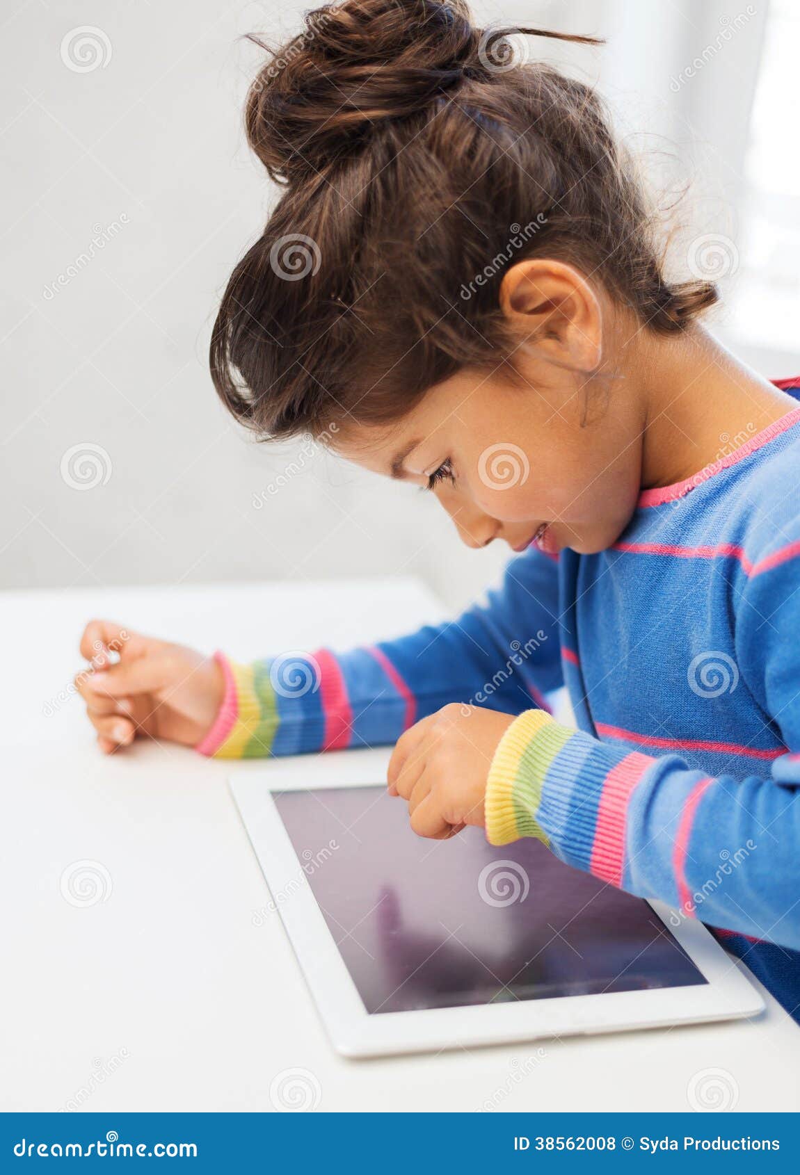 Little girl with tablet pc stock photo. Image of girl - 38562008