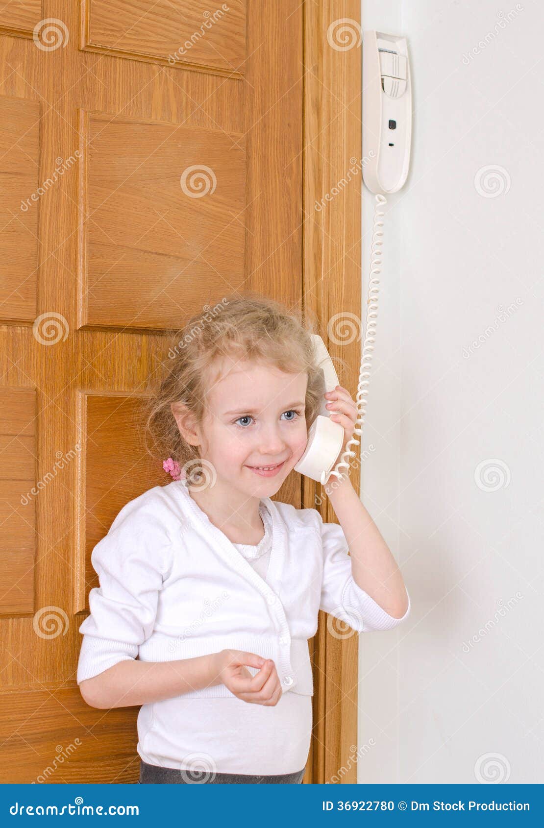 Little Girl Talking on the Intercom Stock Photo - Image of access ...