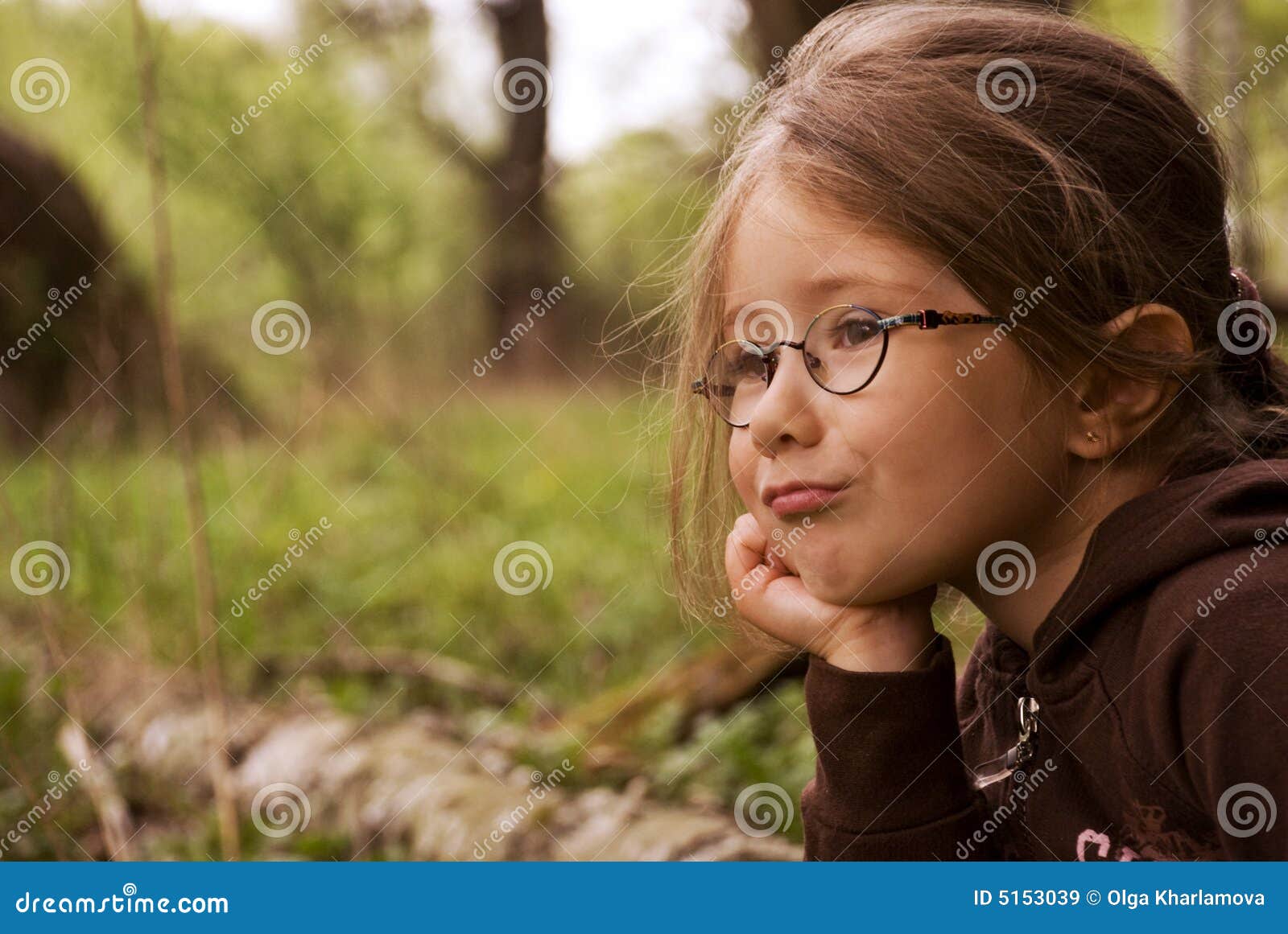 Little girl is thinking stock image. Image of smiling - 5153039