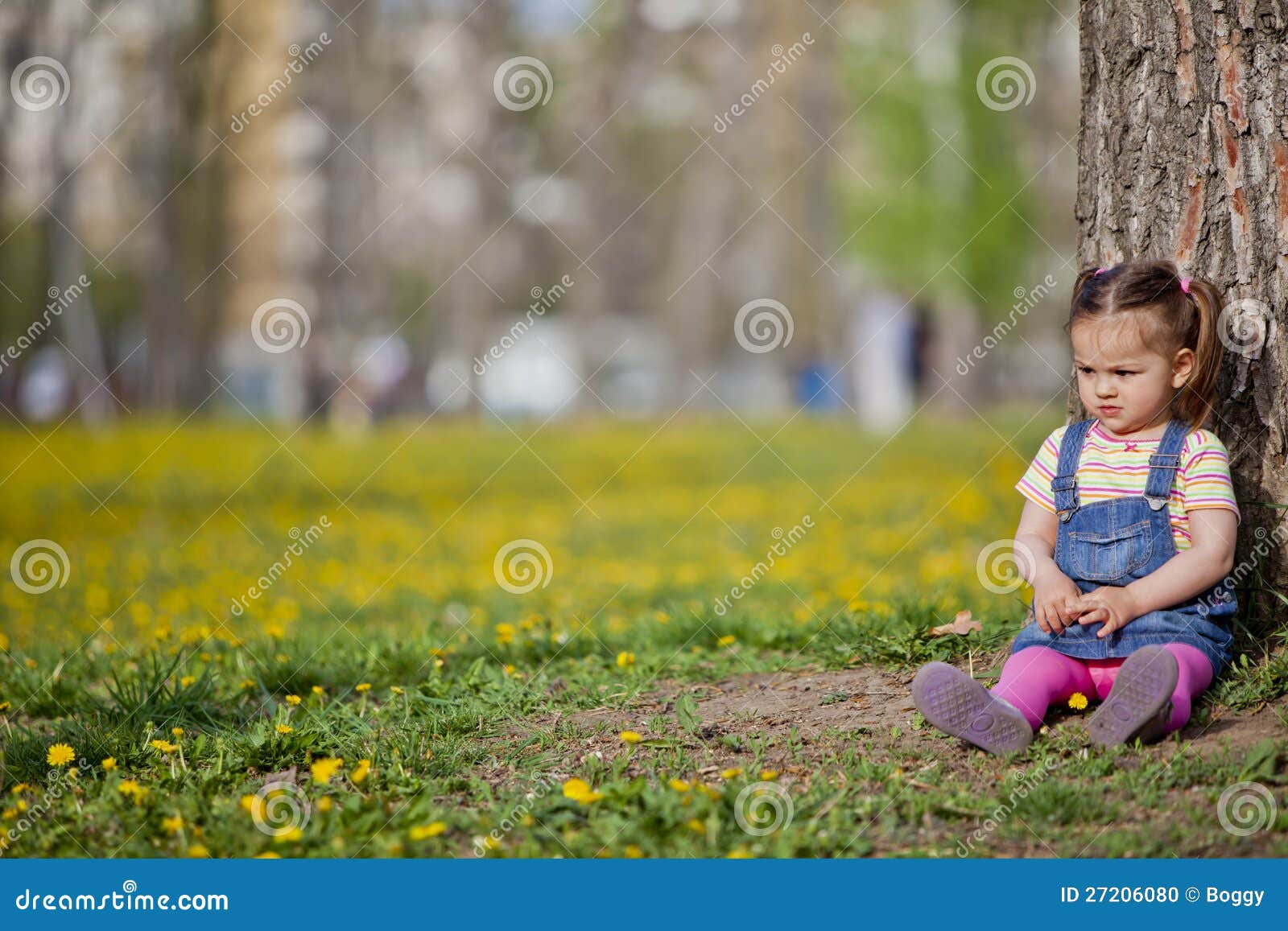 Little girl by the tree stock photo. Image of field, beautiful - 27206080