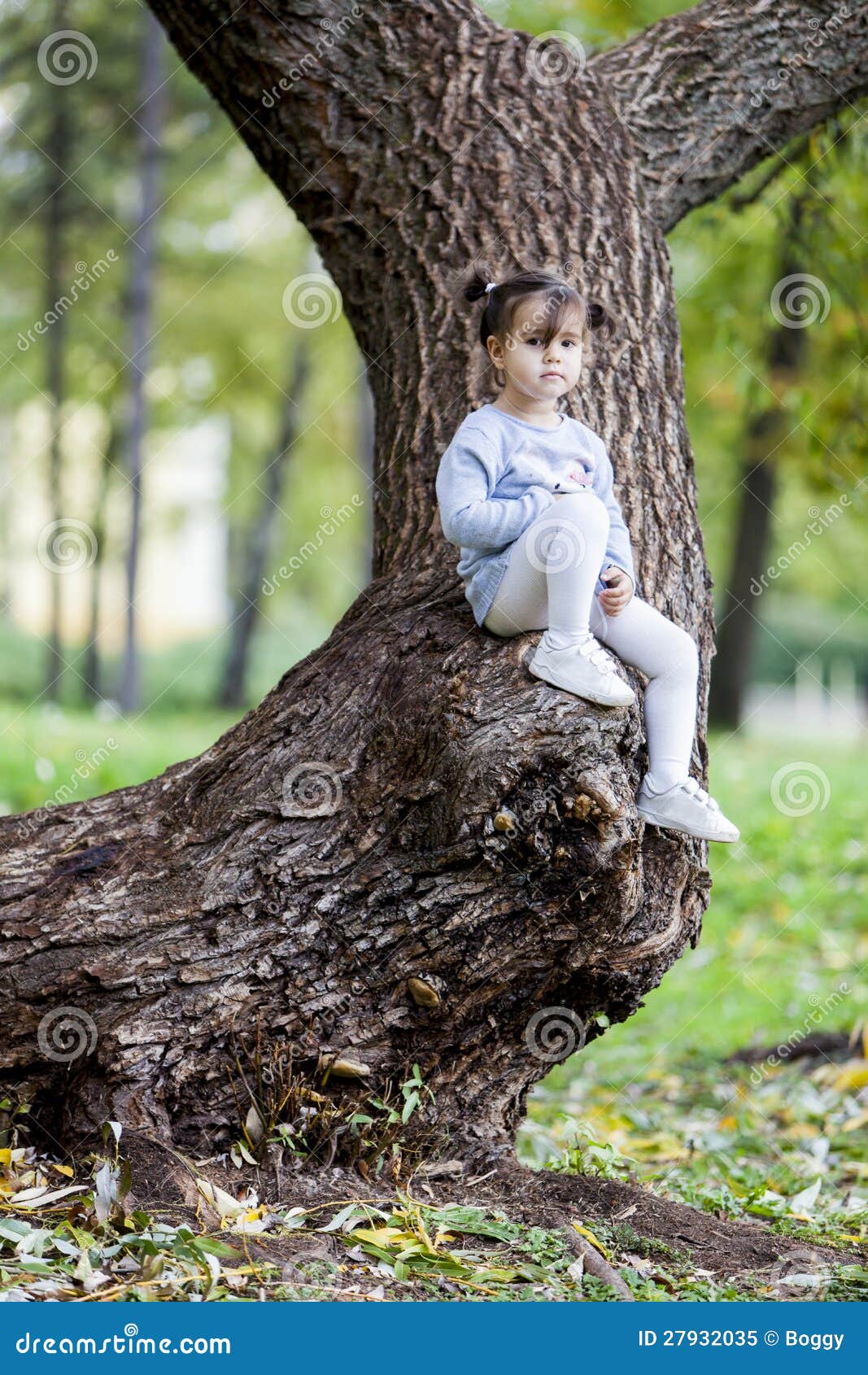 Little girl on the tree stock image. Image of green, season - 27932035