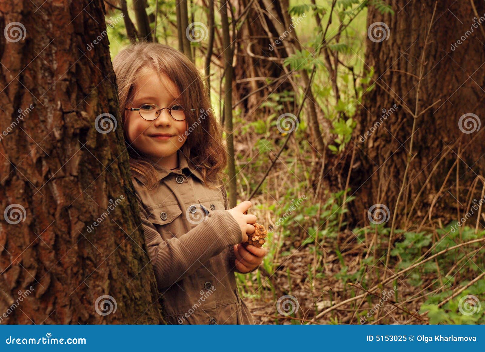 Little girl and a tree stock image. Image of spring, play - 5153025