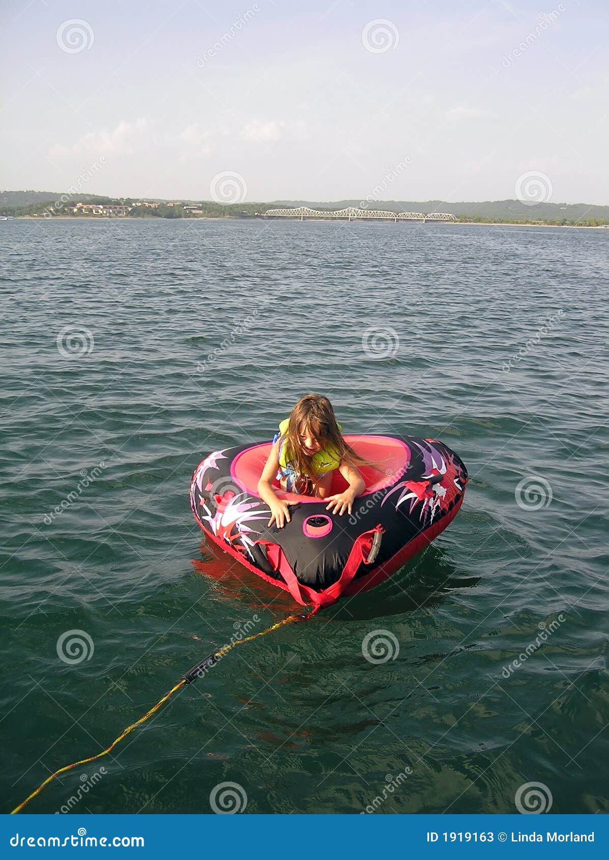 Little Girl Tubing stock image. Image of laugh, raft, goofy - 1919163