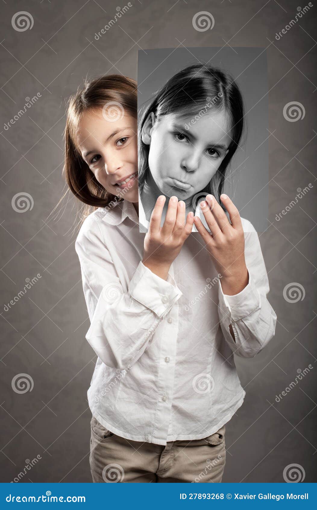 Little girl with two faces stock photo. Image of emotion - 27893268