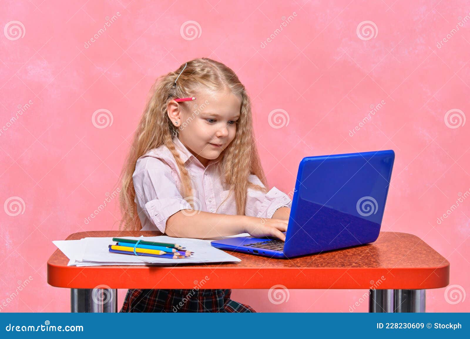 Little Girl is Typing at the Laptop. Online Learning Stock Image ...