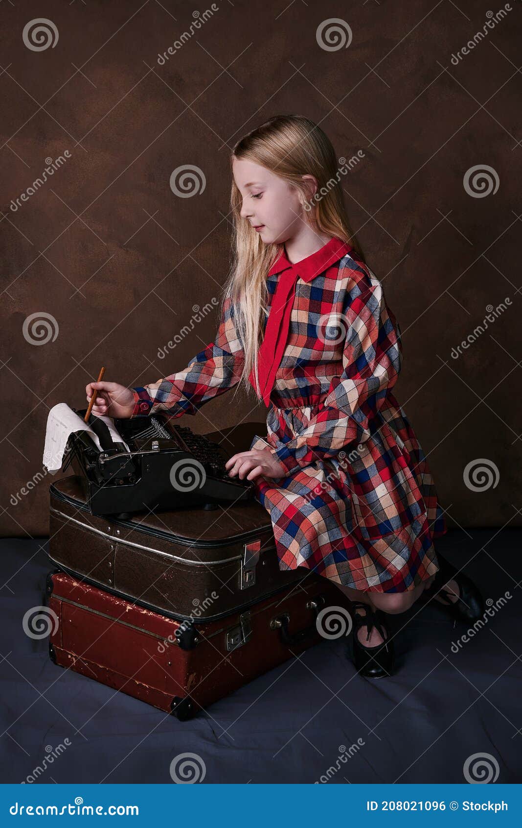 Little Girl is Typing Text on Typewriter. Retro Style Stock Photo ...