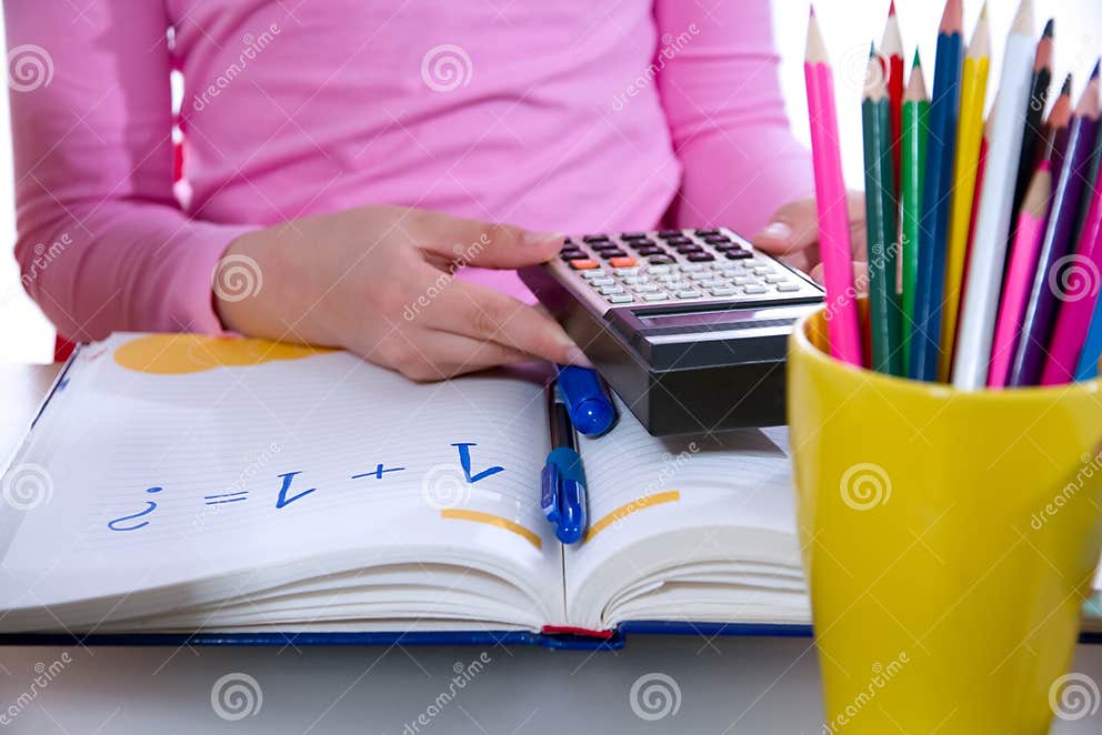 Little Girl Using a Calculator Stock Photo - Image of class, child ...
