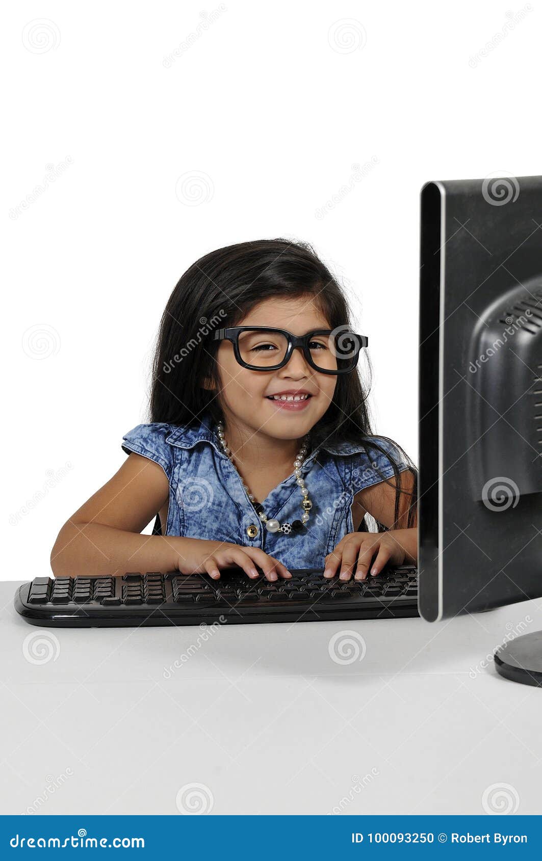 Little Girl Using Computer stock photo. Image of receptionist - 100093250
