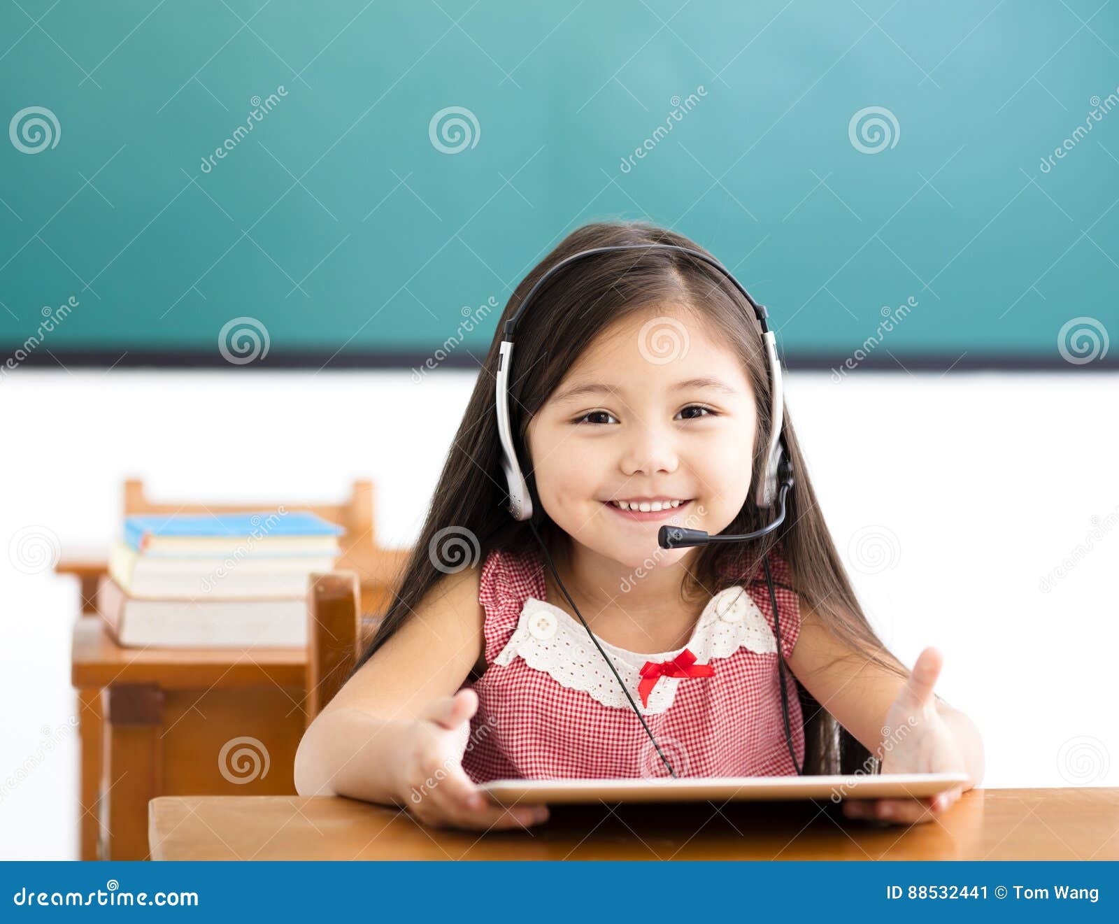 Little Girl Using Digital Tablet in Class Stock Image - Image of ...