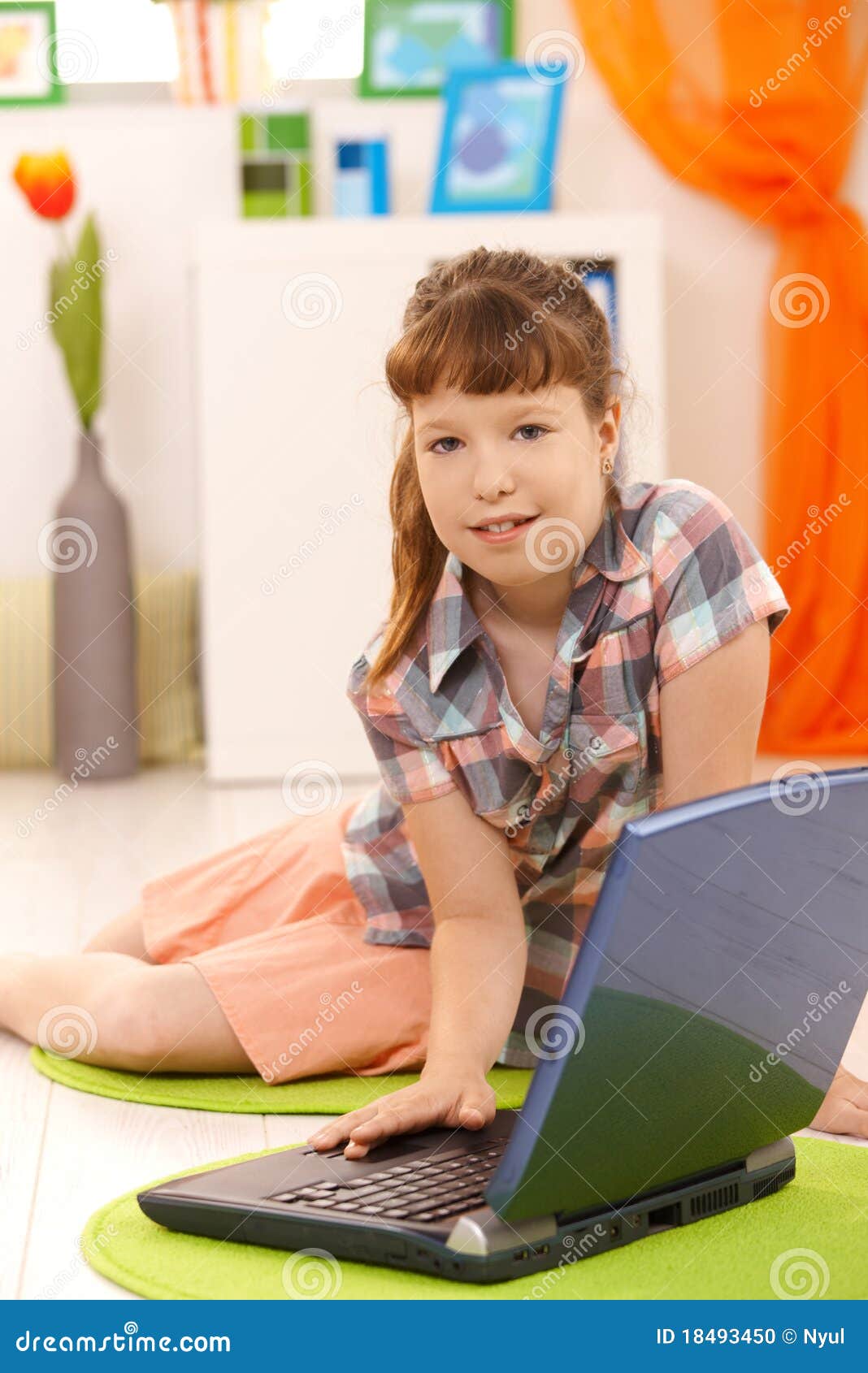 Little girl using laptop stock photo. Image of camera - 18493450