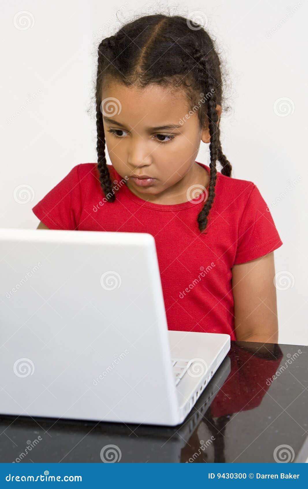 Little Girl Using A Laptop Computer Stock Photo - Image of technology ...