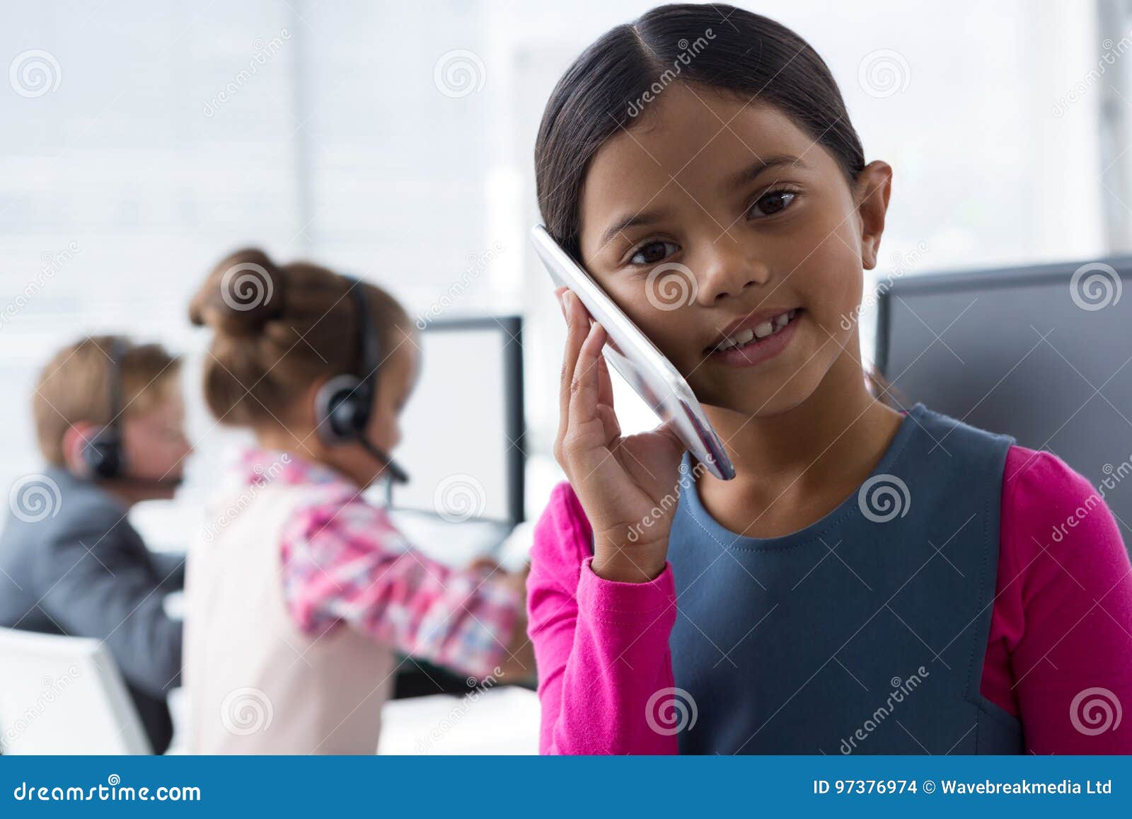 Little Girl Using Phone in Office Stock Photo - Image of male, keyboard ...
