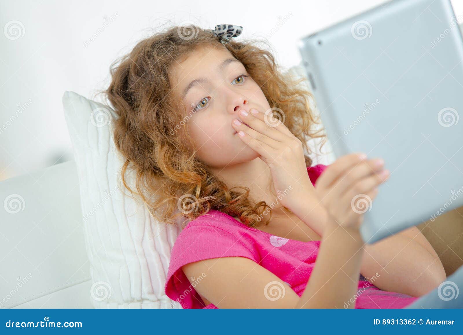 Little Girl Using Tablet Computer at Home Stock Photo - Image of ...