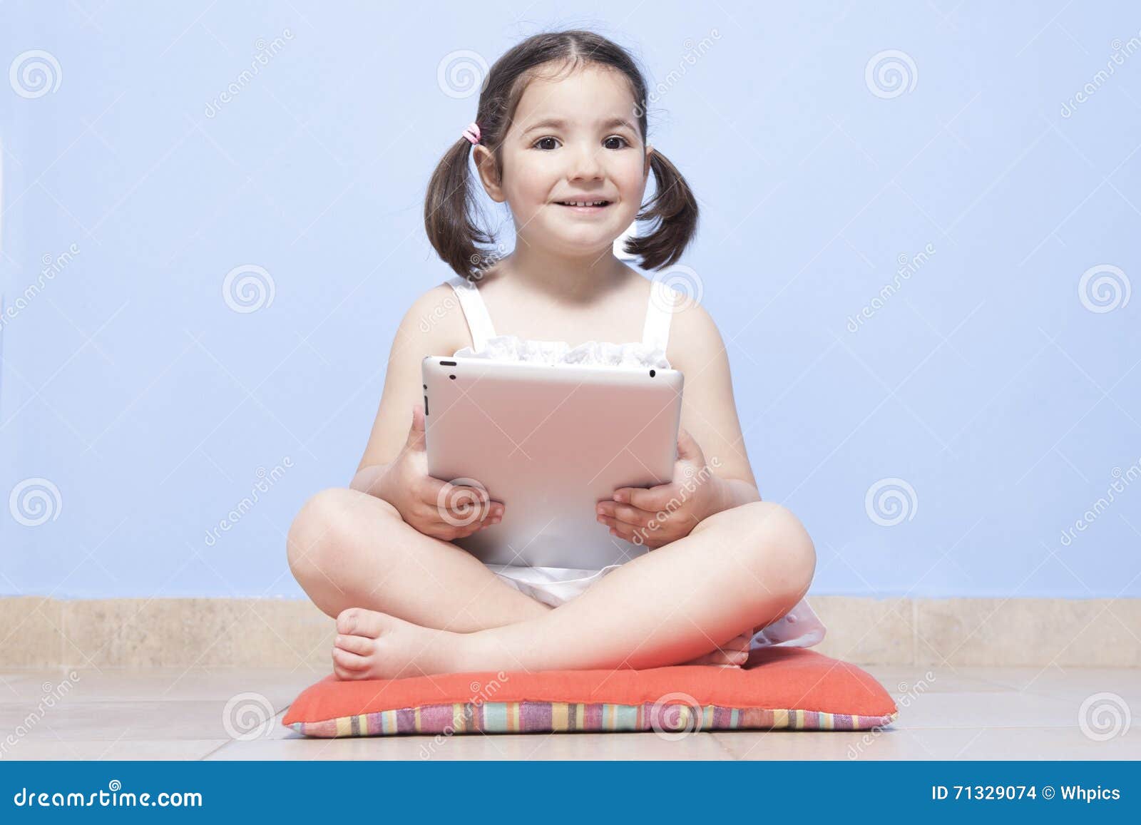 Little Girl Using Tablet Computer Stock Photo - Image of indoors ...