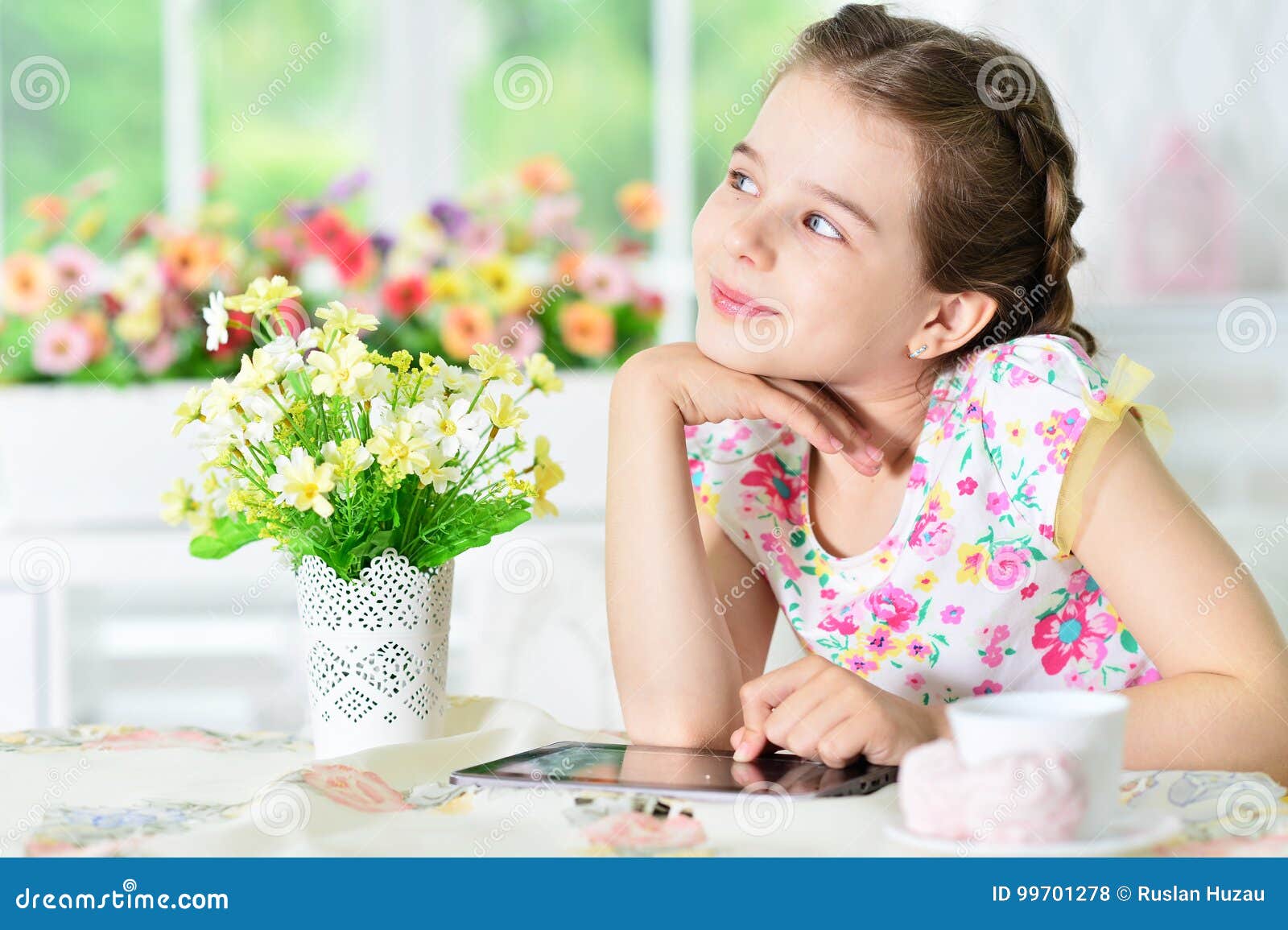 Little girl using tablet stock photo. Image of people - 99701278